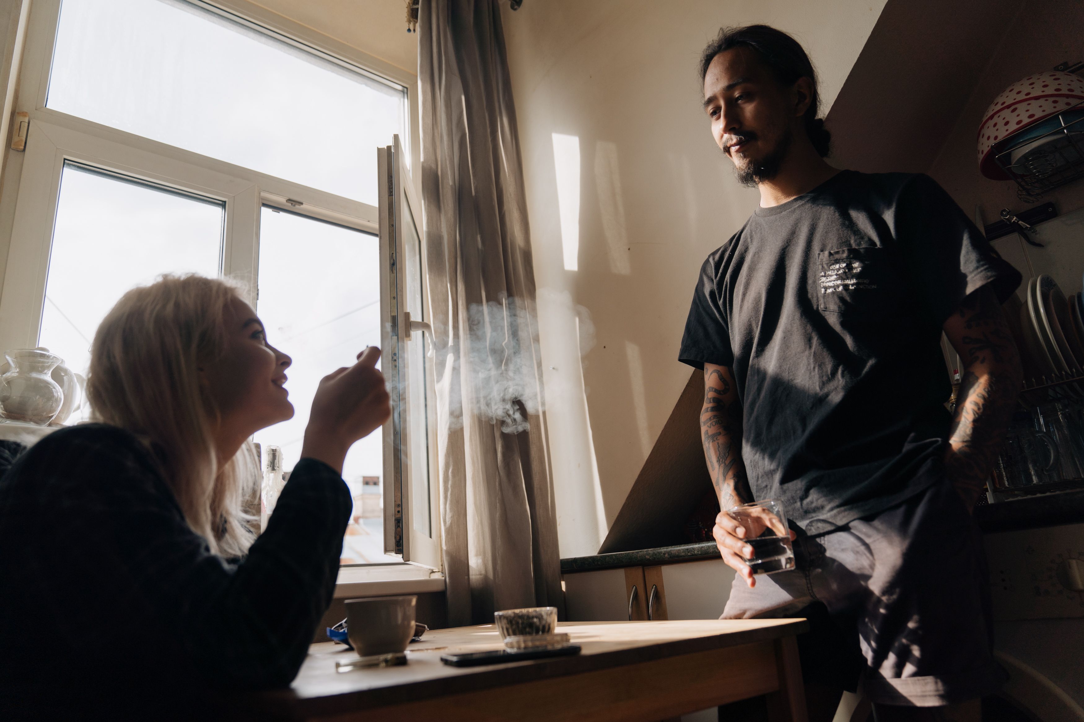 A Couple Smoking Cigarettes · Free Stock Photo