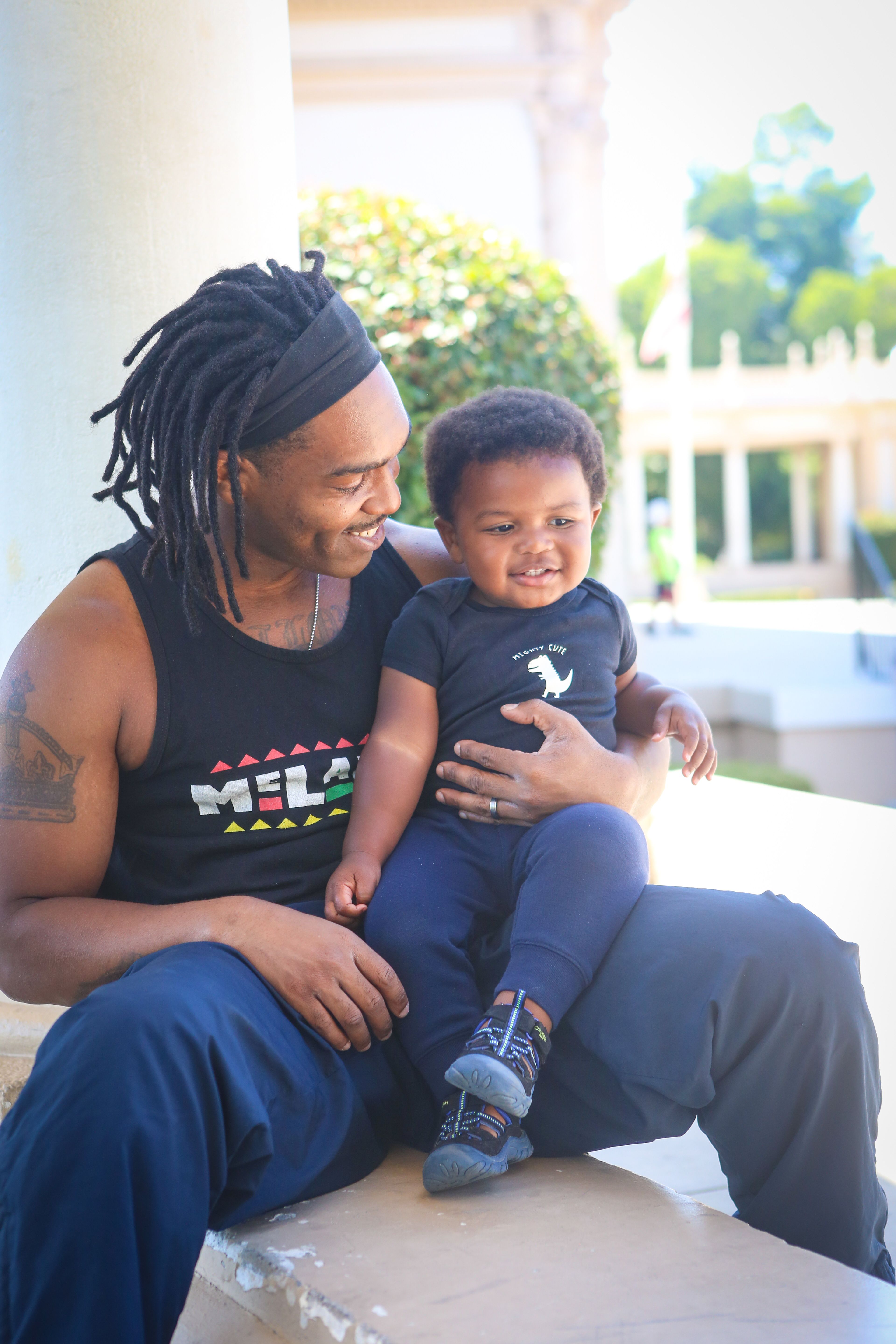 Boy Sitting on Man's Lap · Free Stock Photo