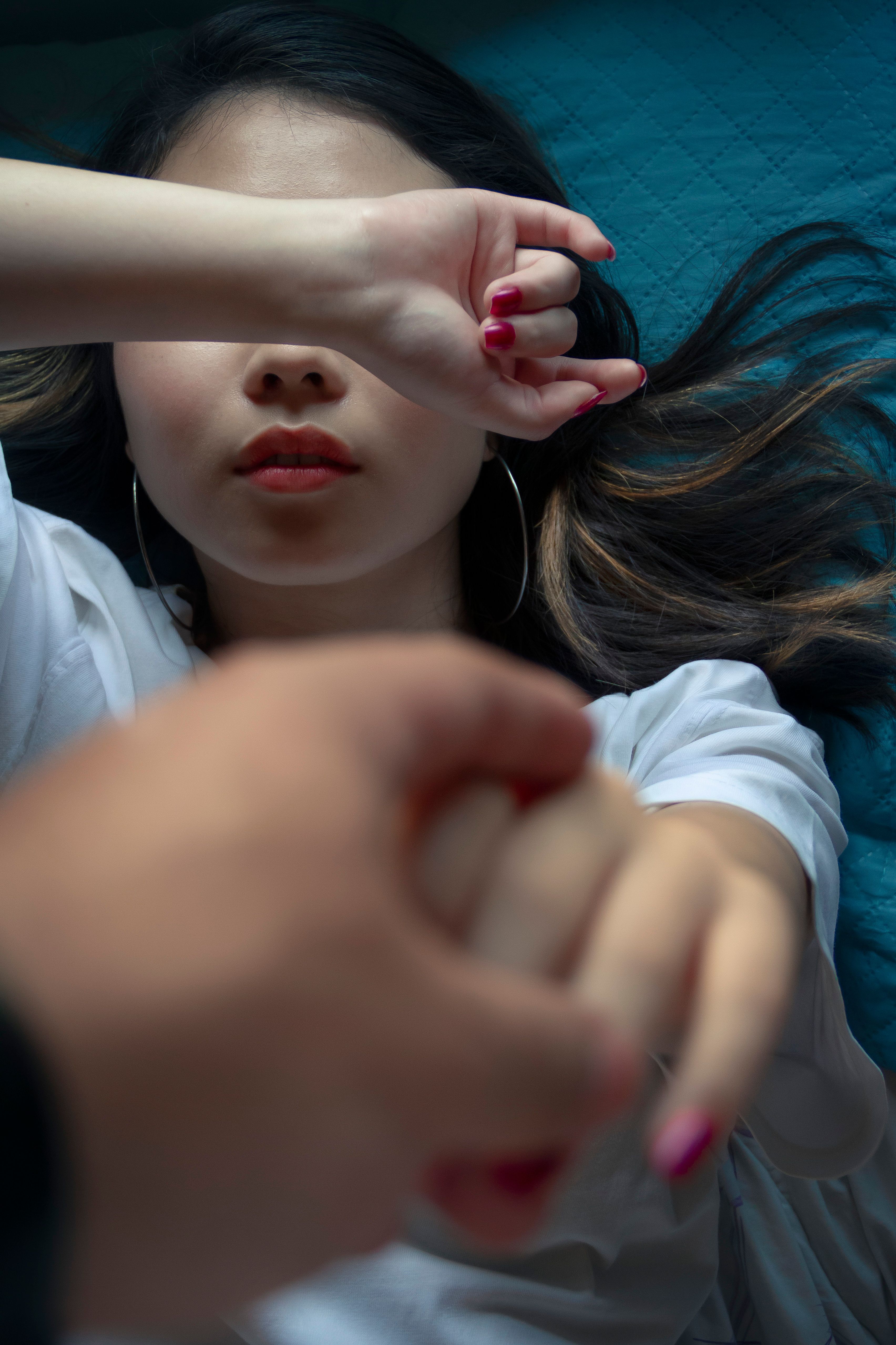 Overhead Shot of a Woman Covering her Eyes · Free Stock Photo