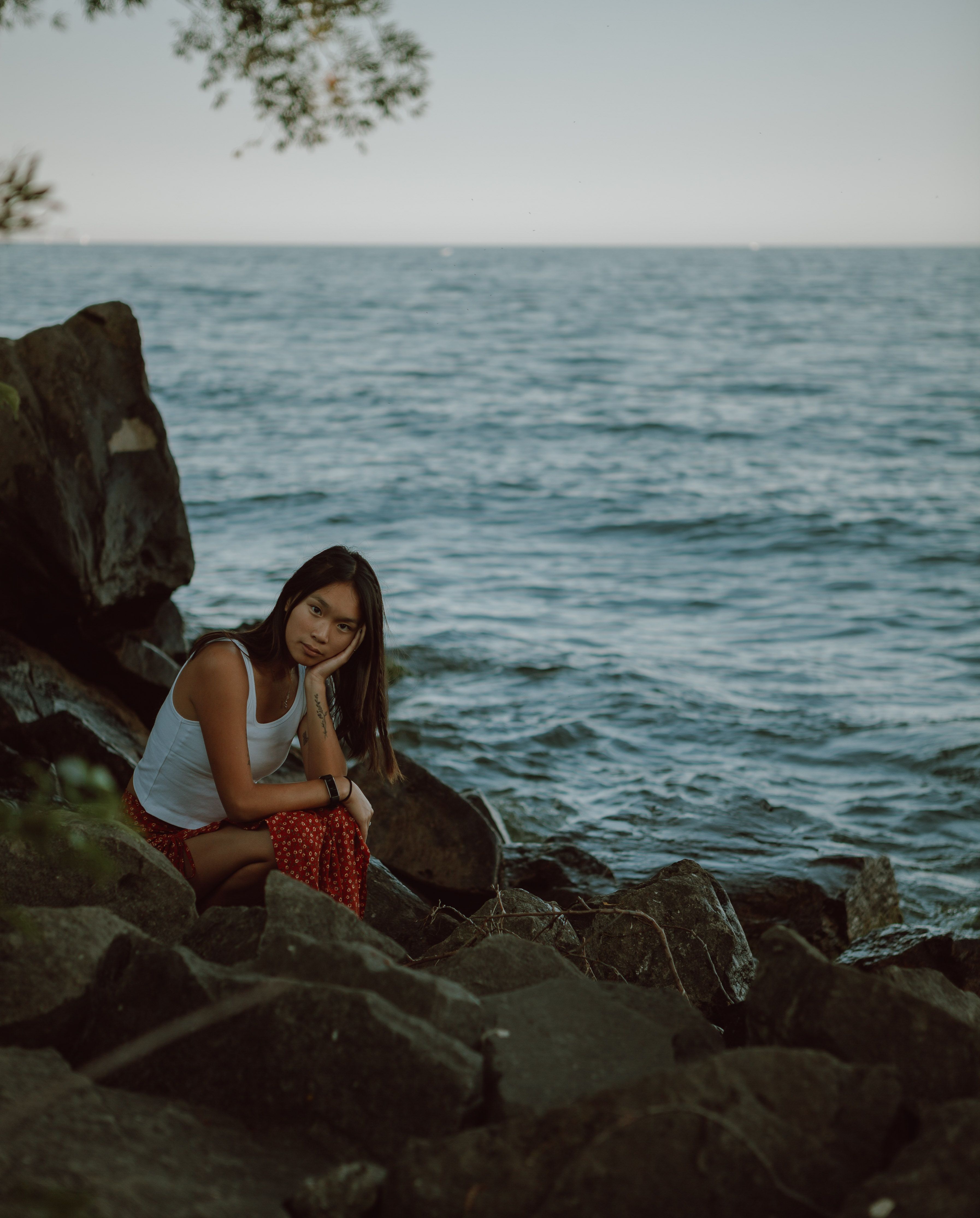 Young peaceful woman in green field · Free Stock Photo