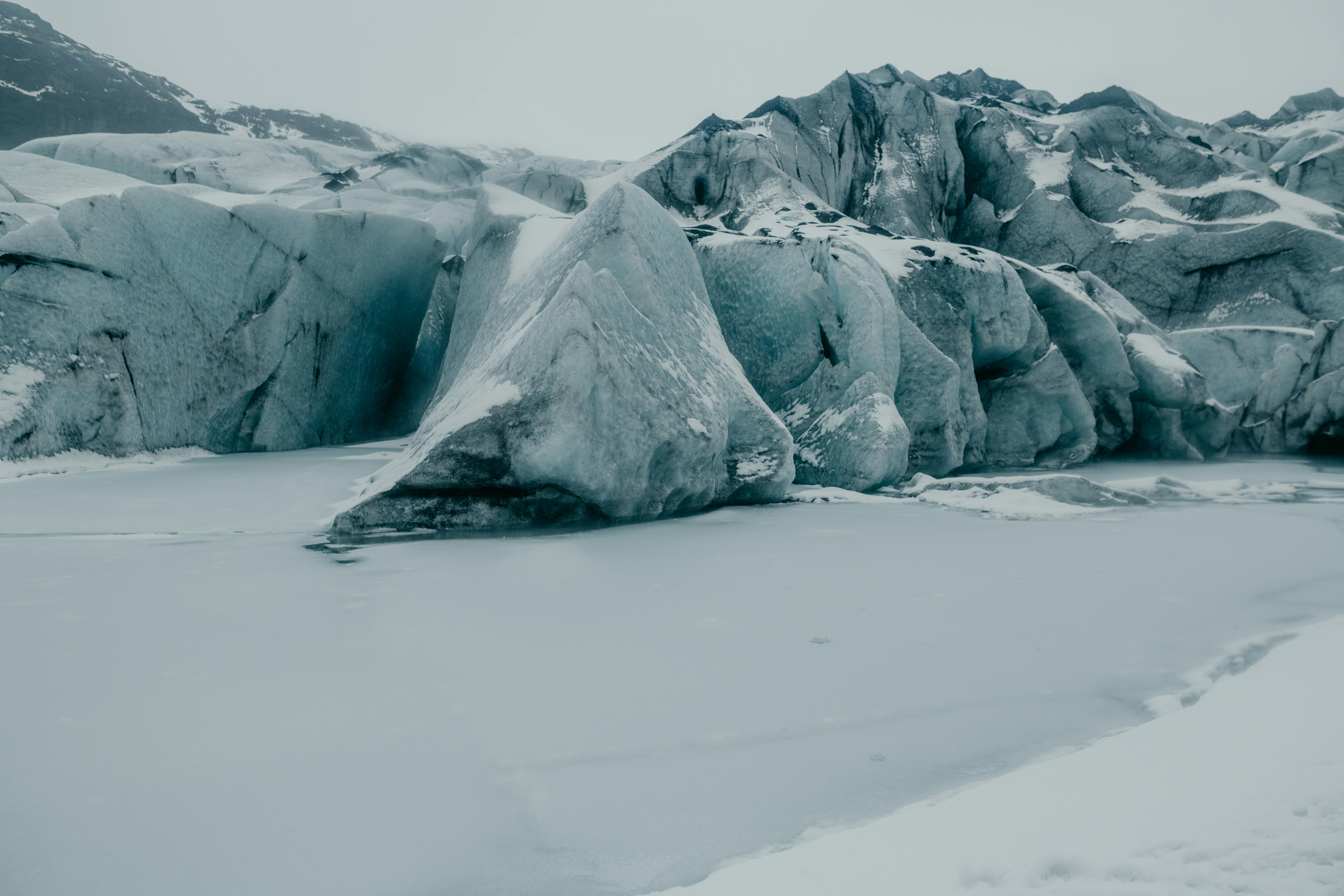 Snow around Barren Rocks · Free Stock Photo