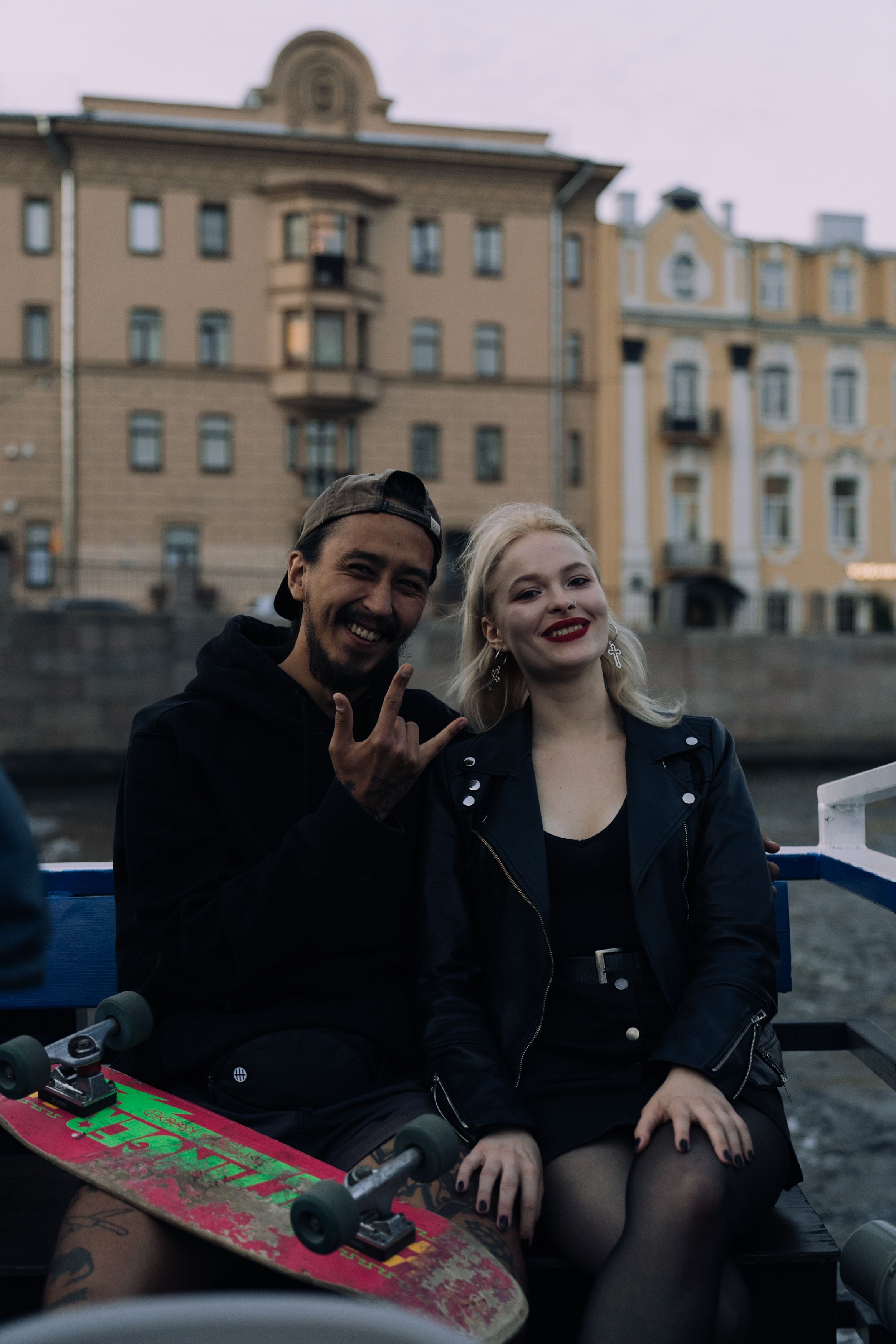 Happy Couple sitting beside each other · Free Stock Photo