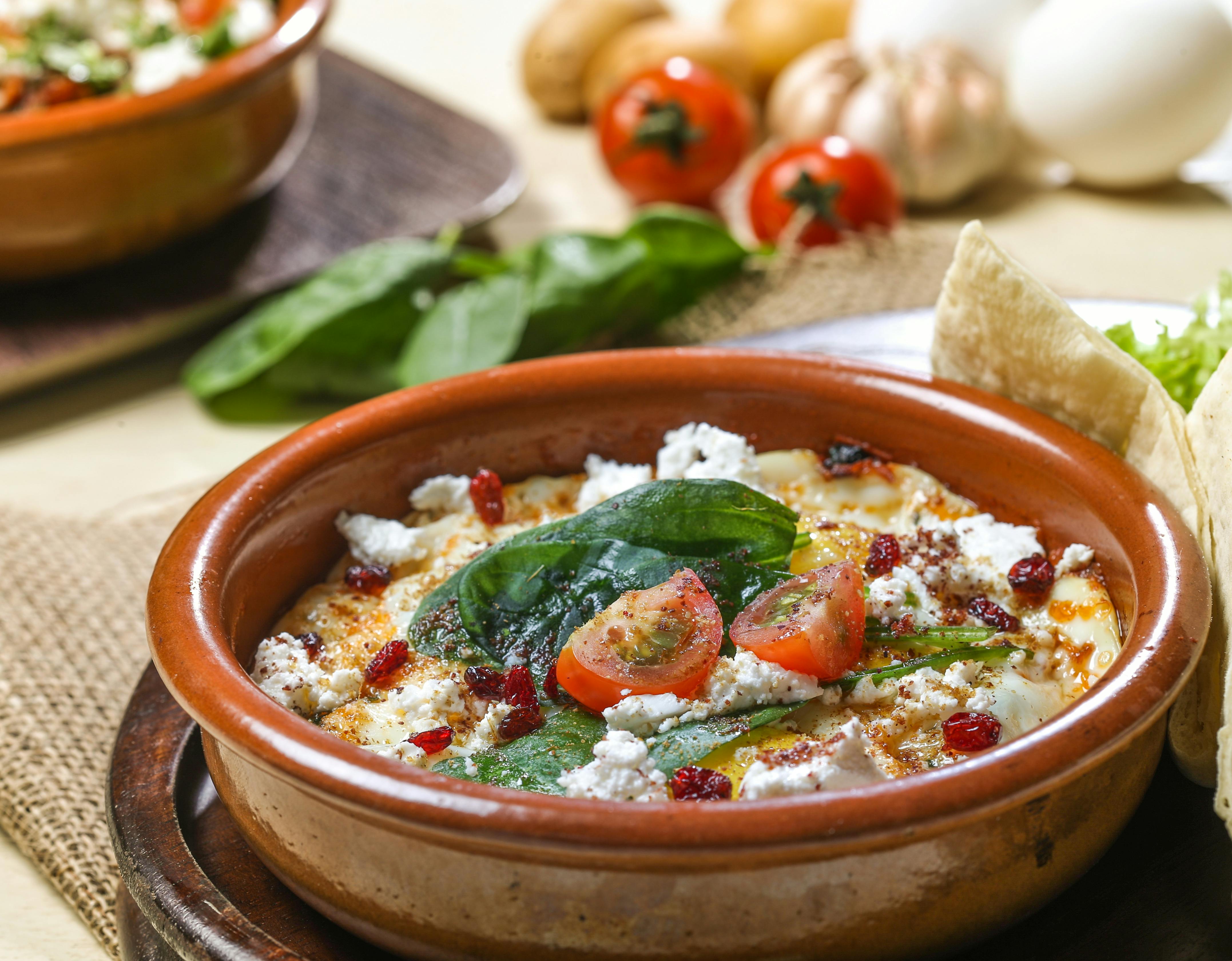 Delicious Cooked Food on Brown Earthenware Plate · Free Stock Photo