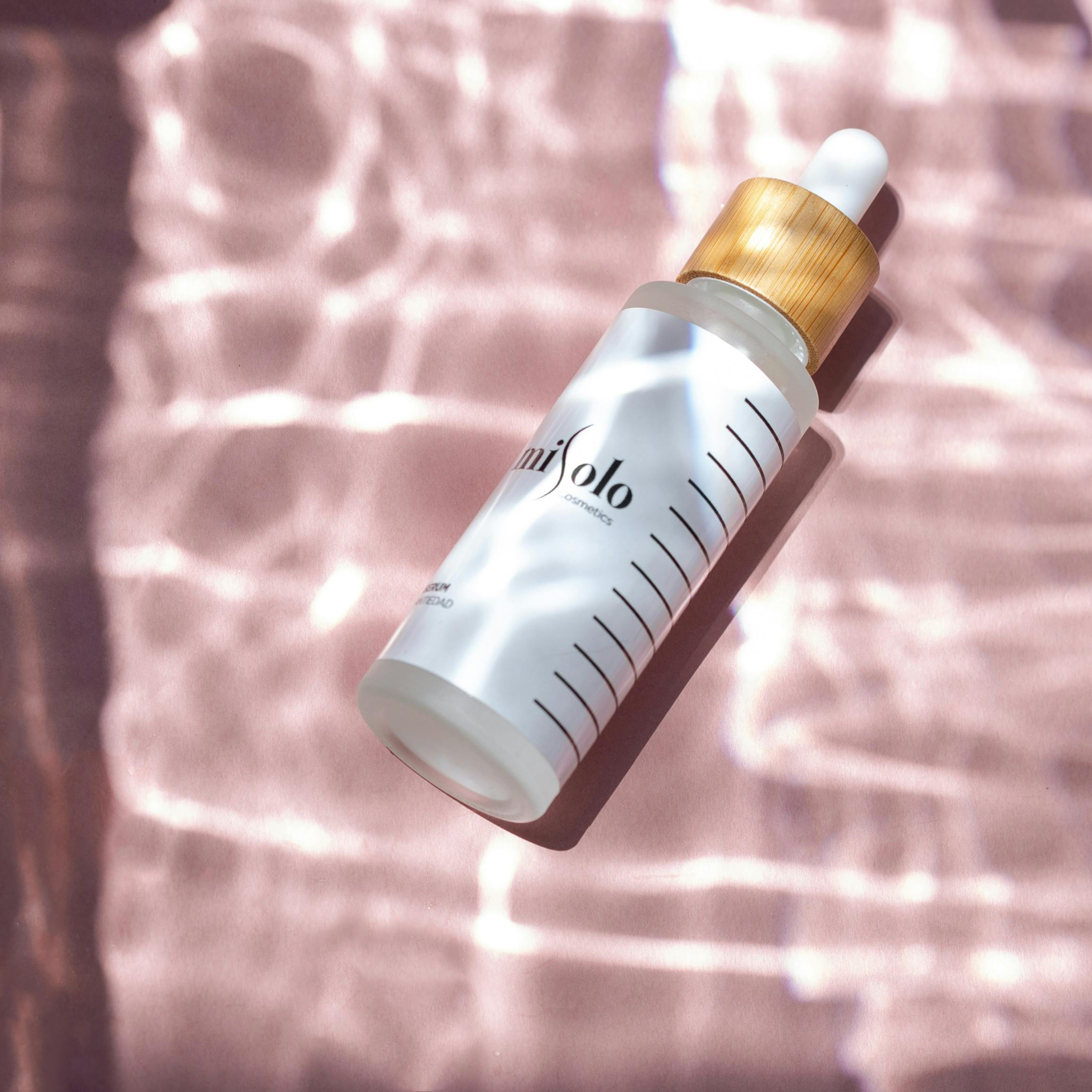 Woman Holding a Misolo Cream · Free Stock Photo