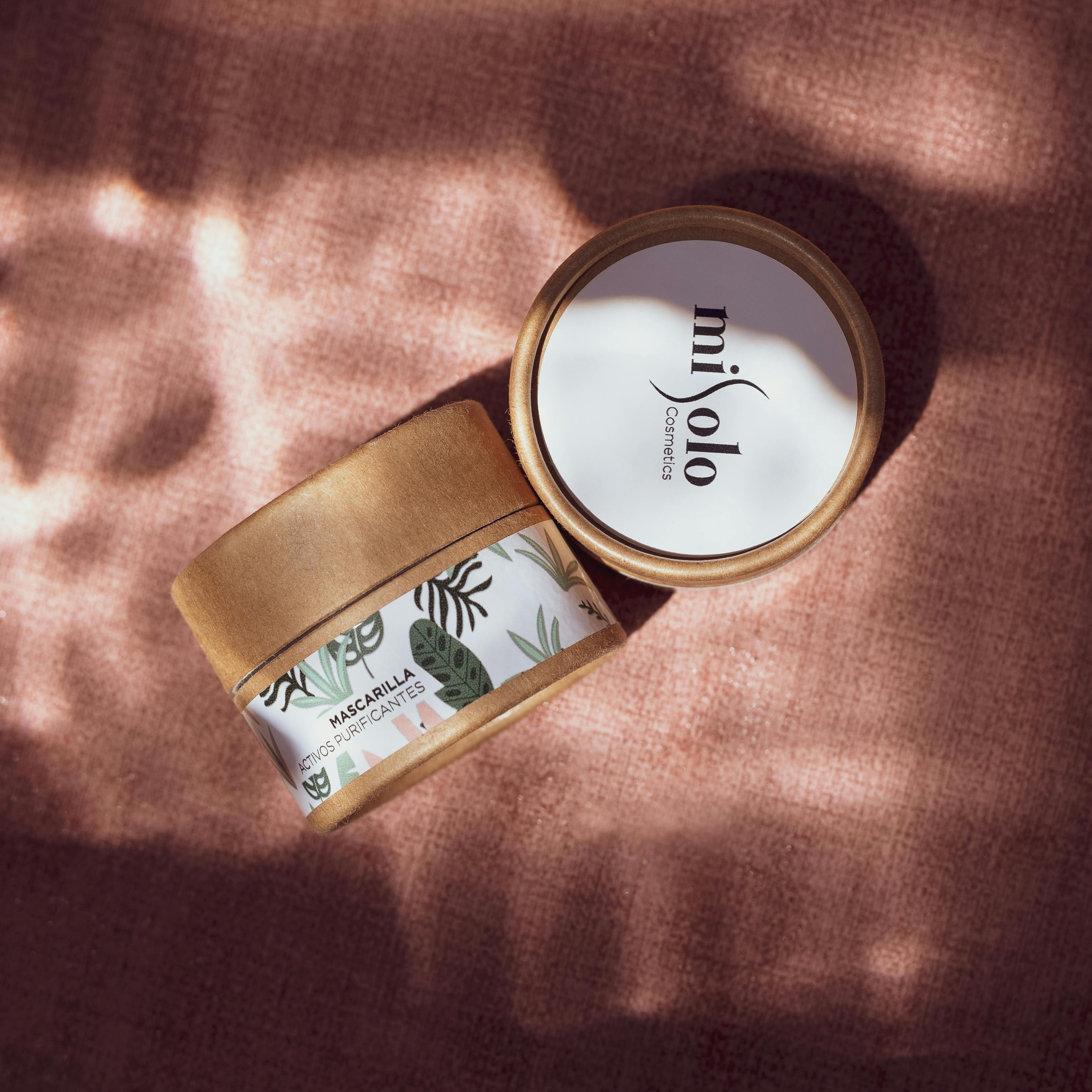 Woman Holding a Misolo Cream · Free Stock Photo