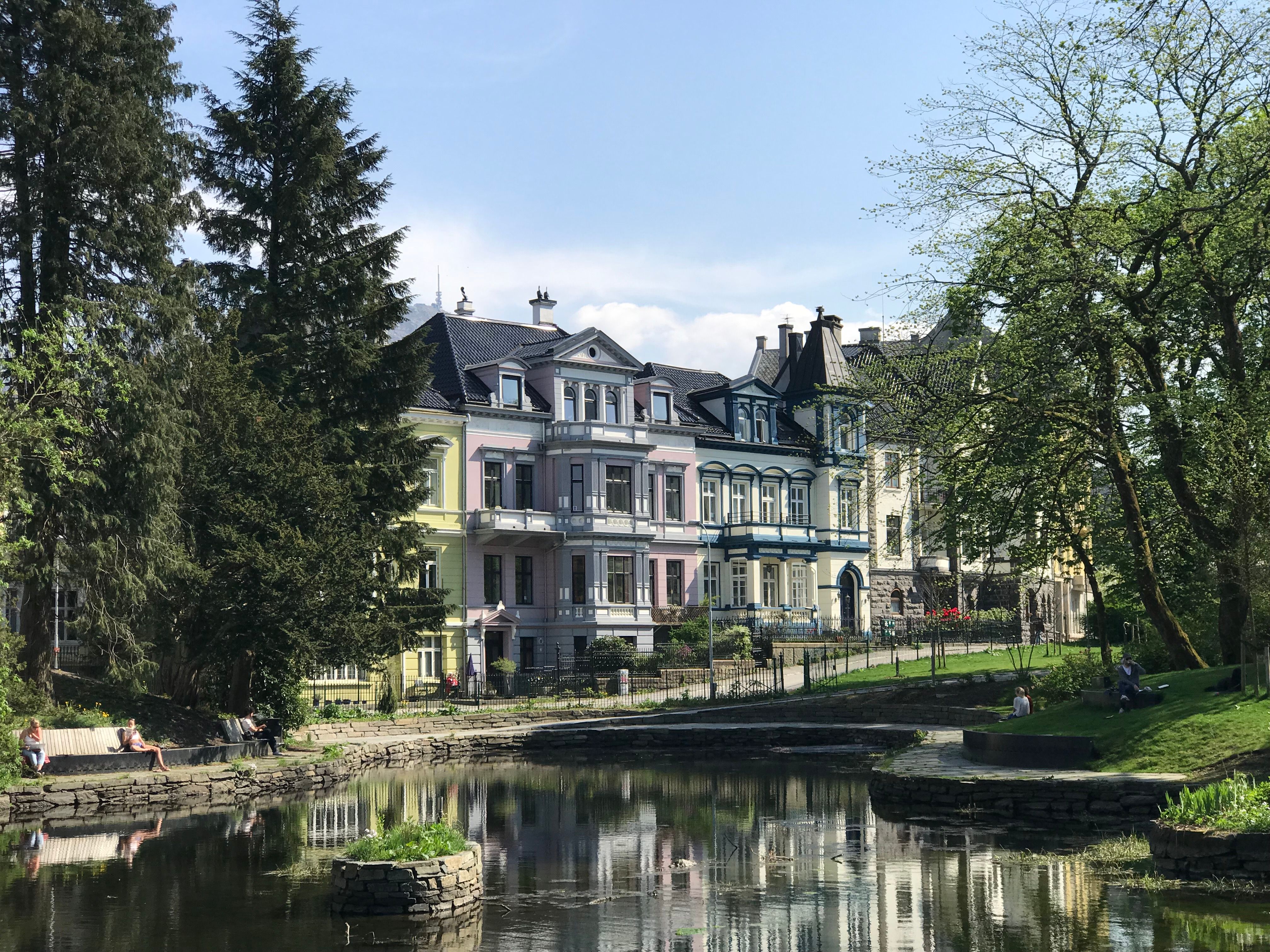 Beautiful Concrete Houses Near Green Trees and Pond · Free Stock Photo