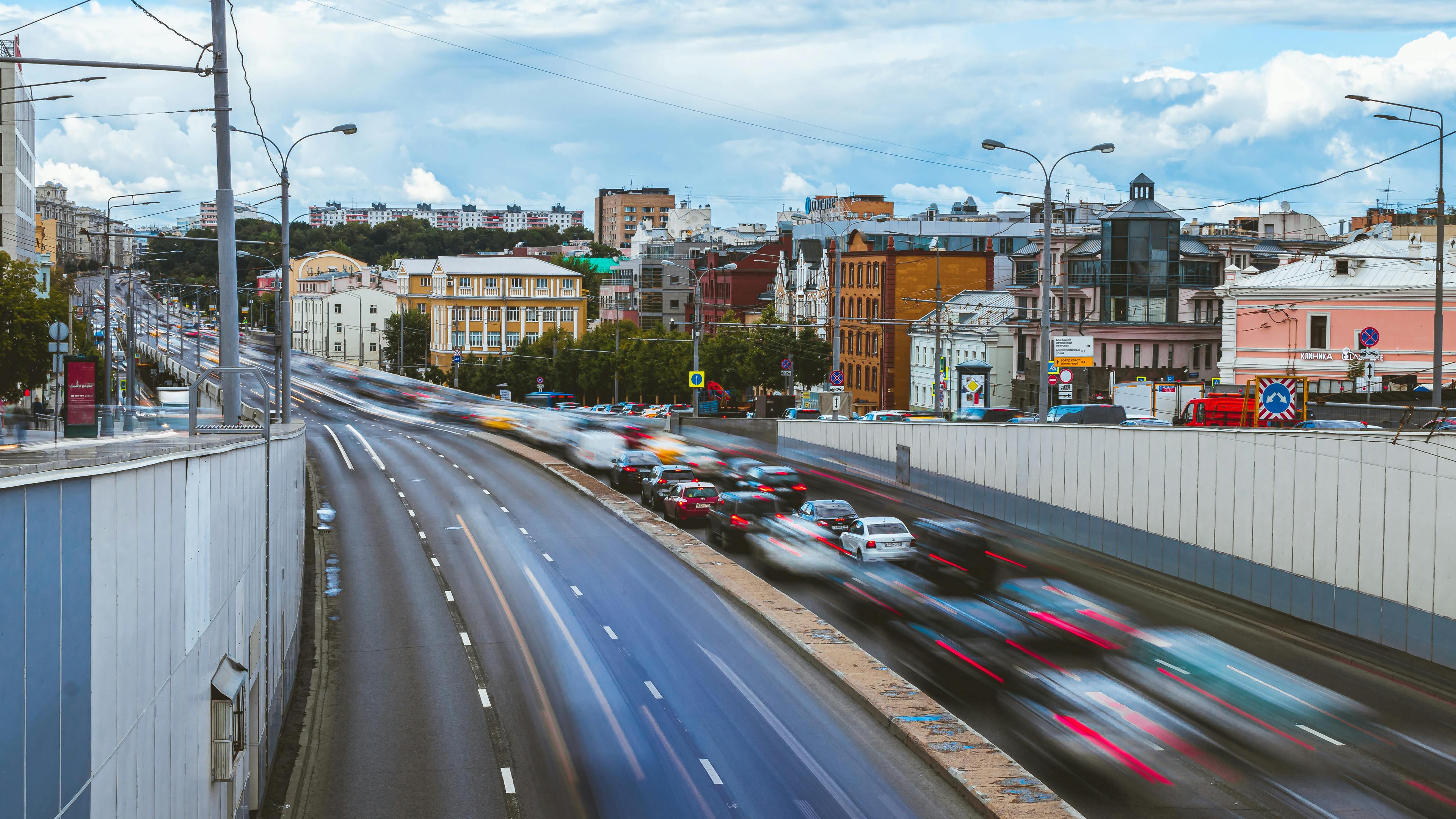 Motion Blur of Moving Cars on a Busy Road · Free Stock Photo