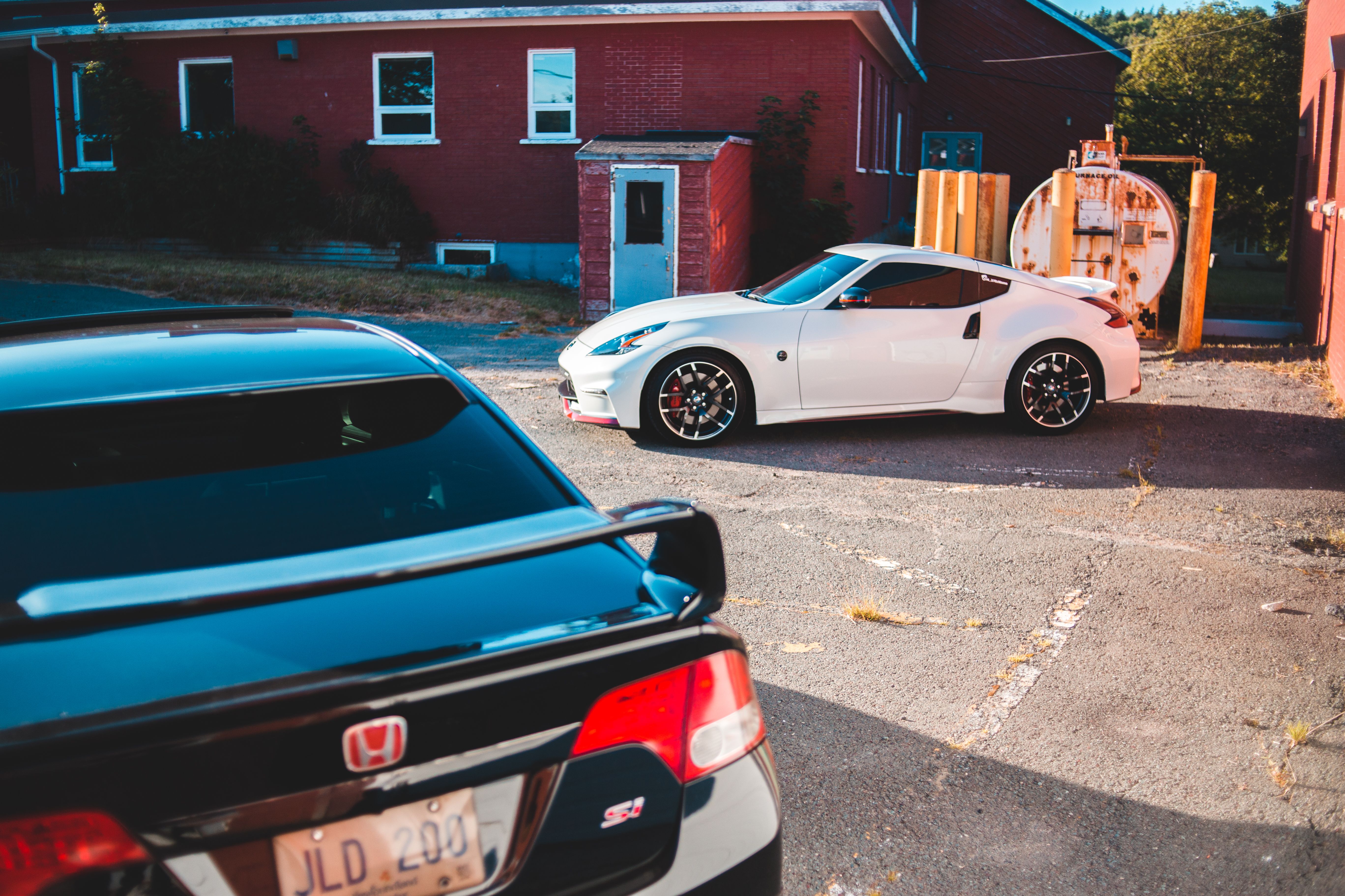 A Car Parked Outside a House · Free Stock Photo