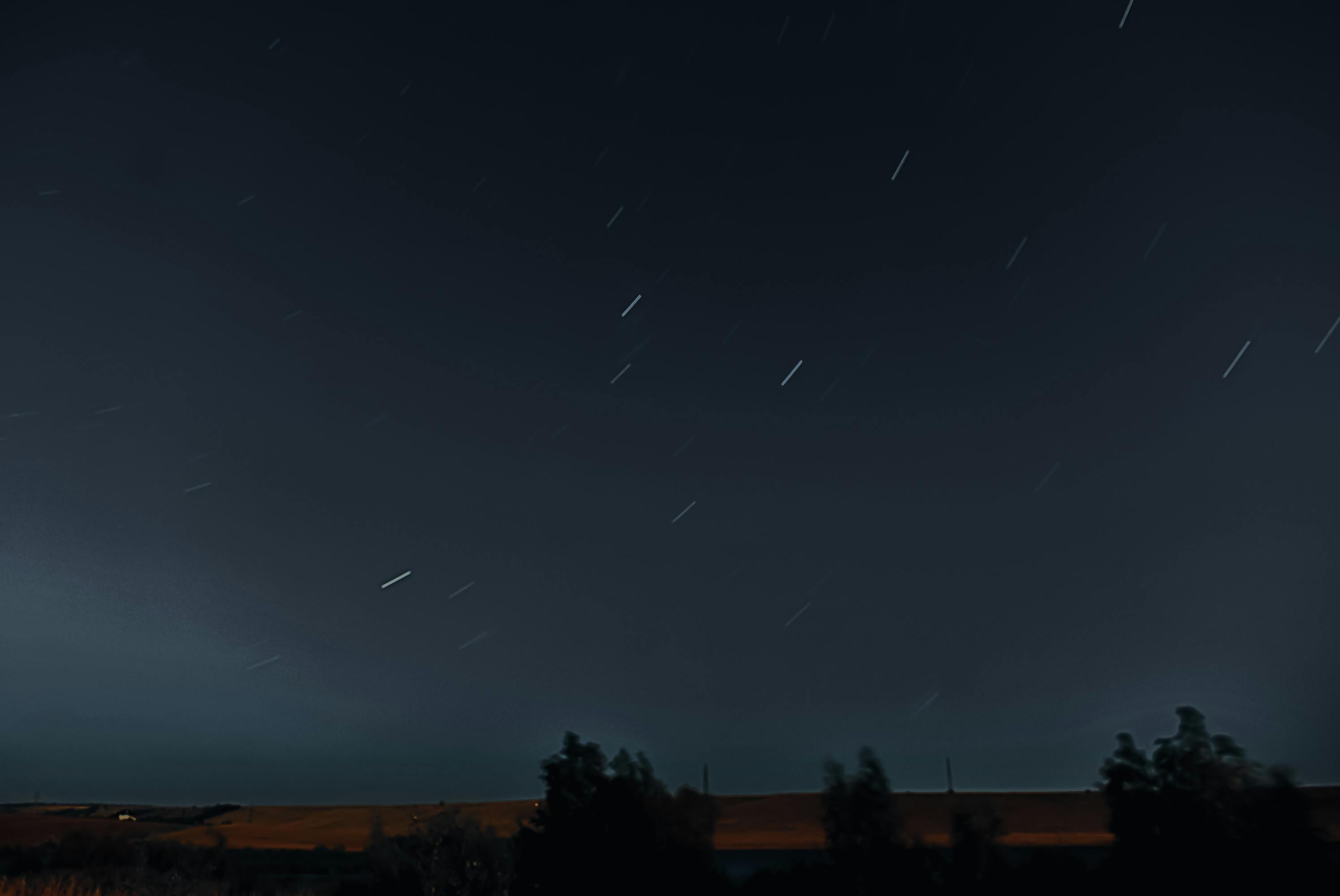 Night sky above field in countryside · Free Stock Photo