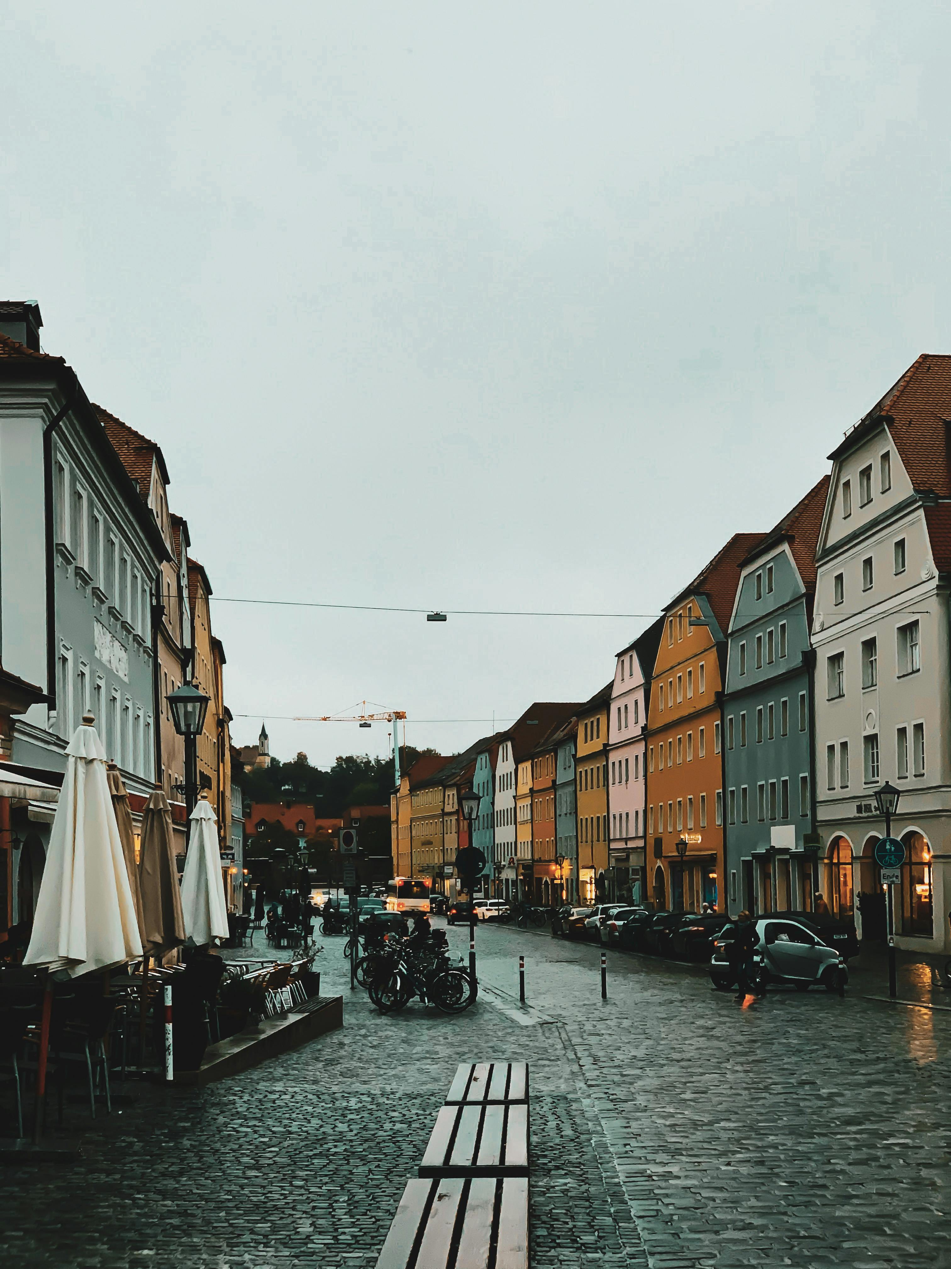 Narrow city street with classic buildings · Free Stock Photo