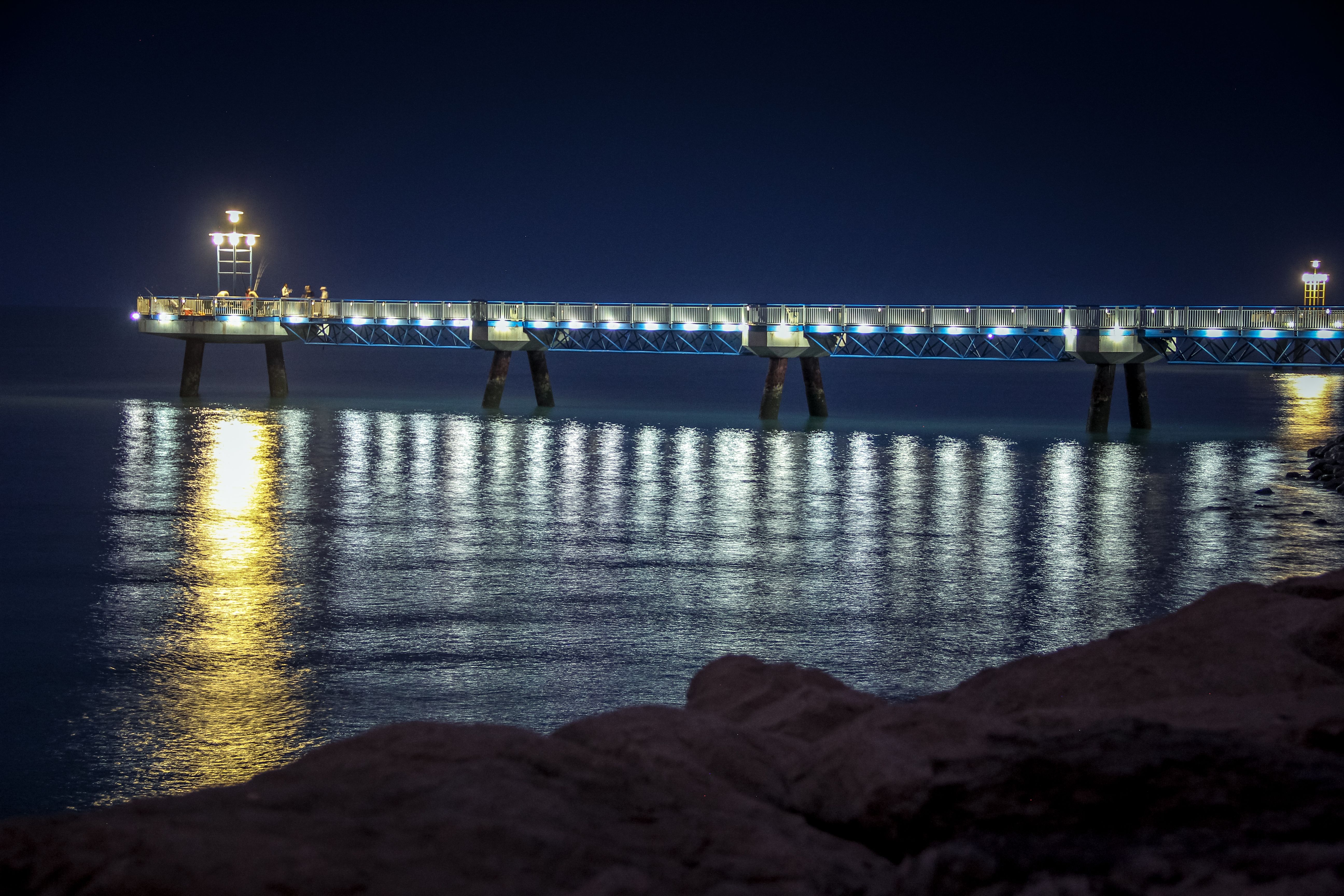 People Walking on Bridge during Night Time · Free Stock Photo