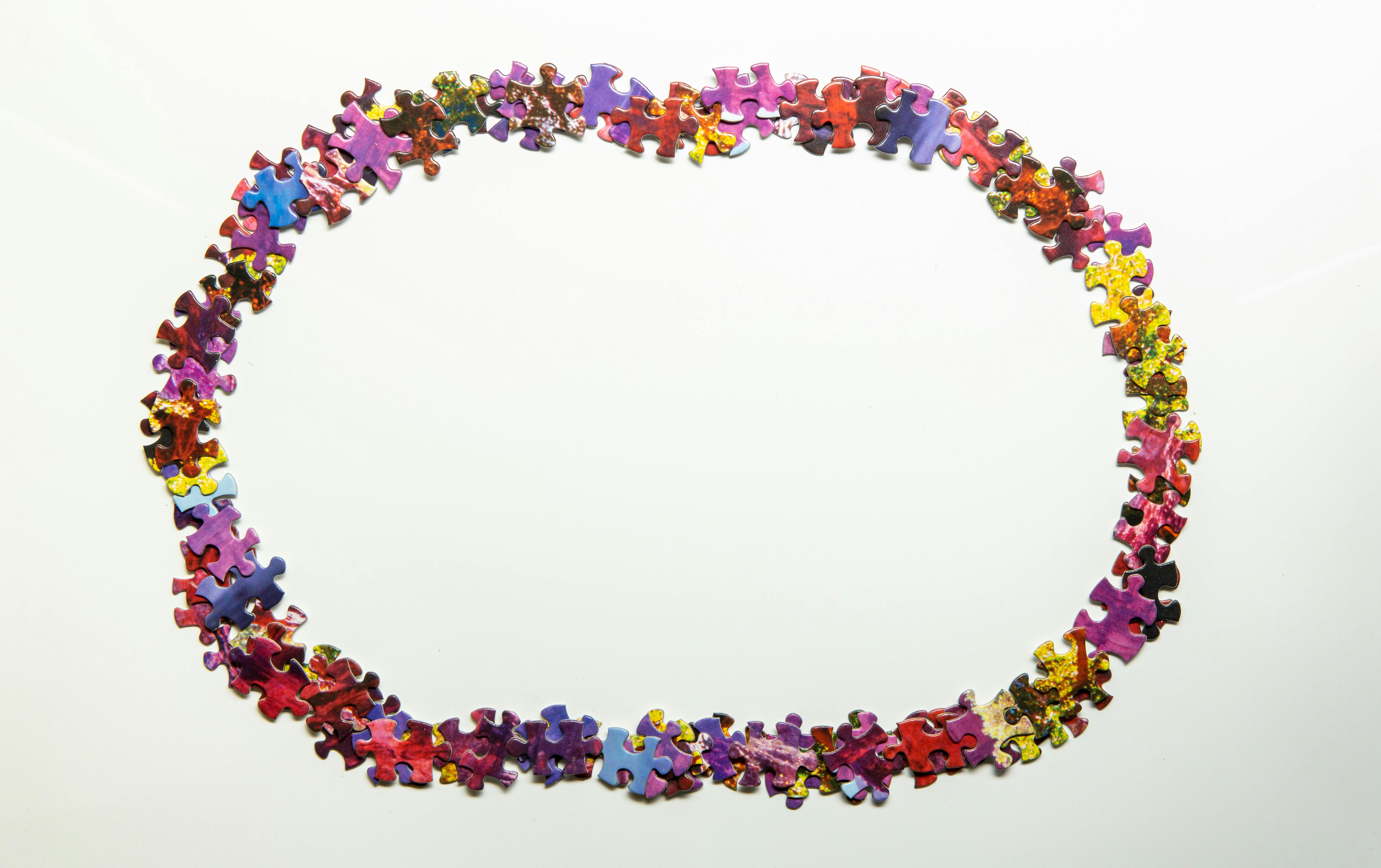 Oval Formed from Puzzle Pieces · Free Stock Photo