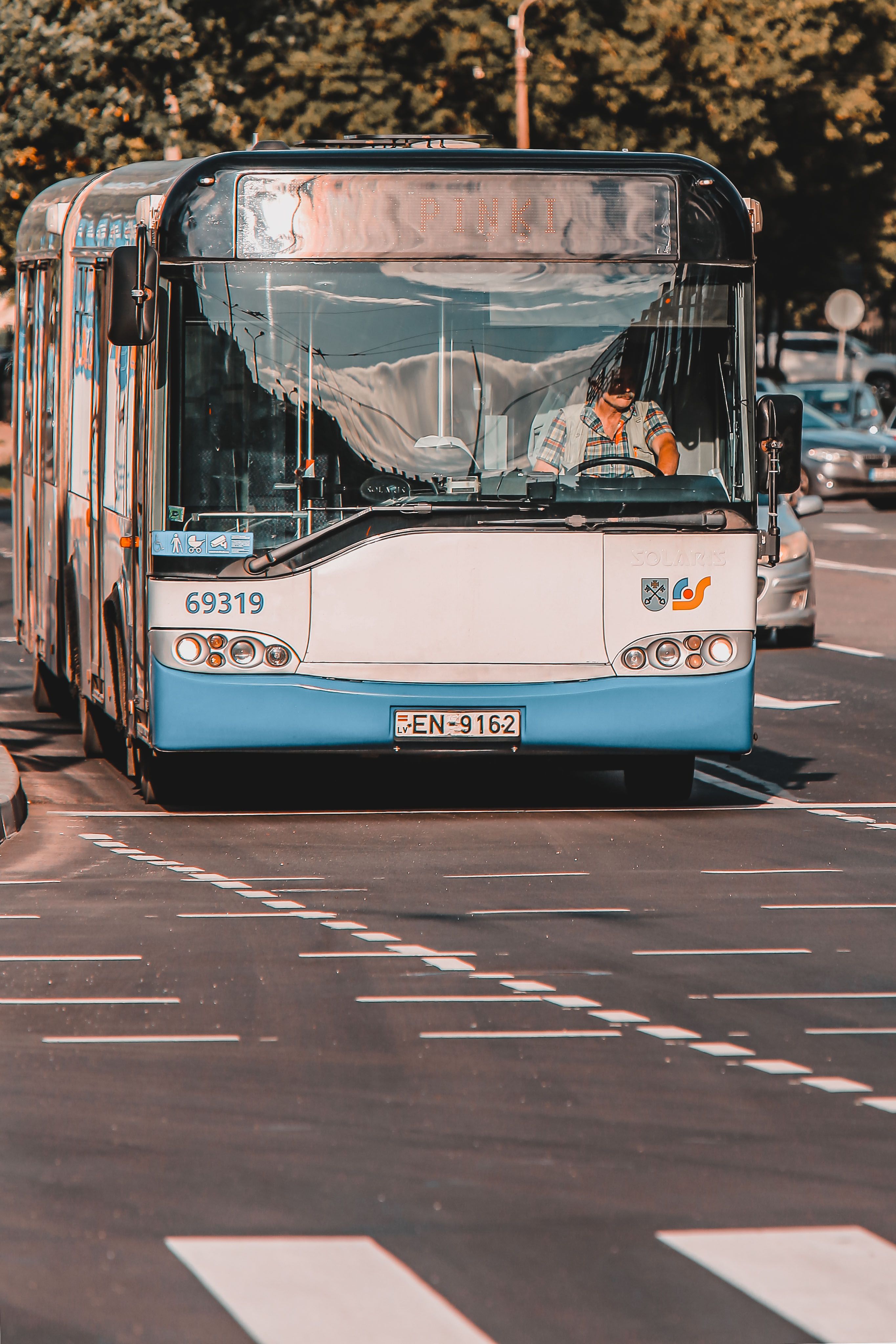 Yellow Bus on City Road · Free Stock Photo