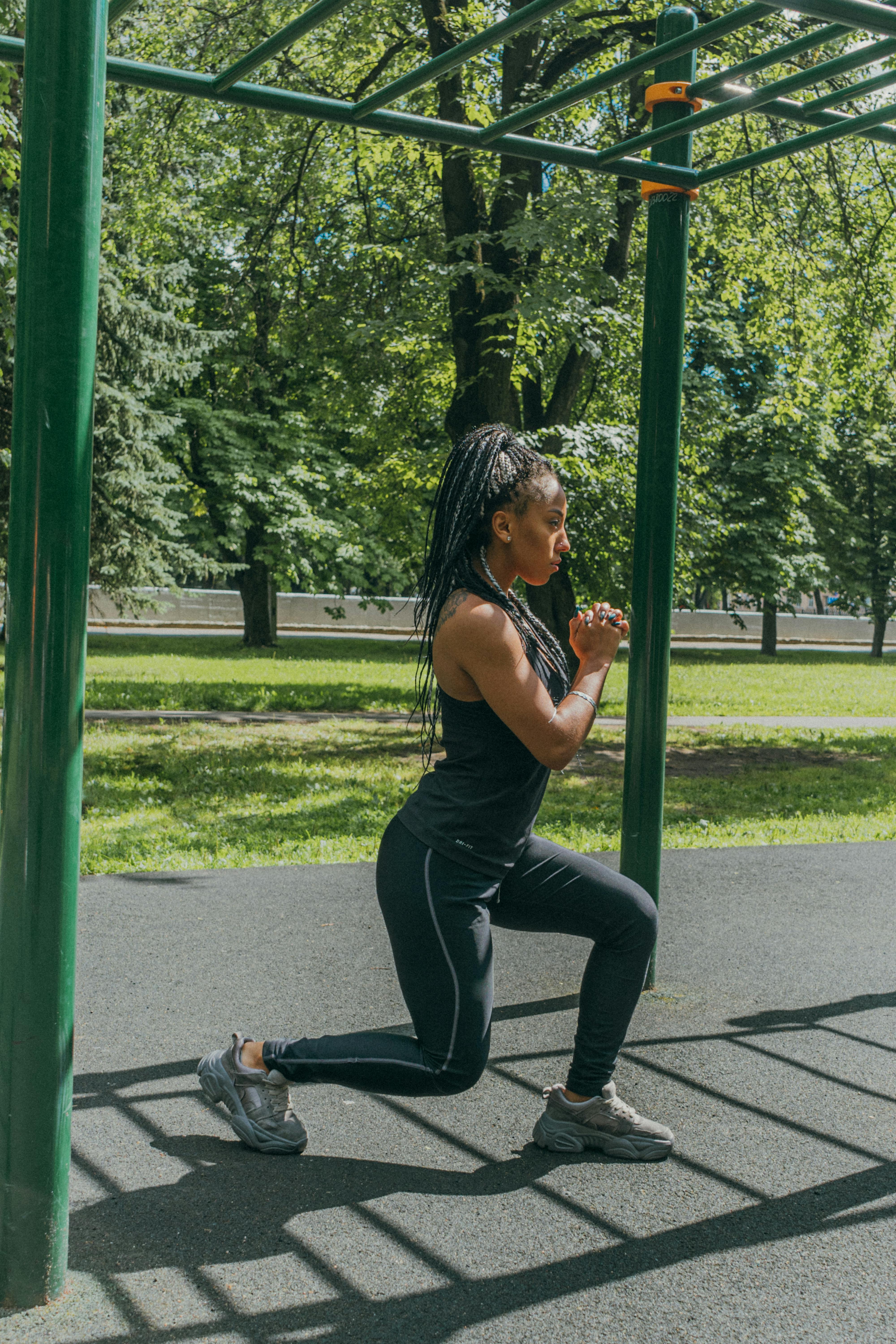 Person in Black Sportswear Working Out · Free Stock Photo