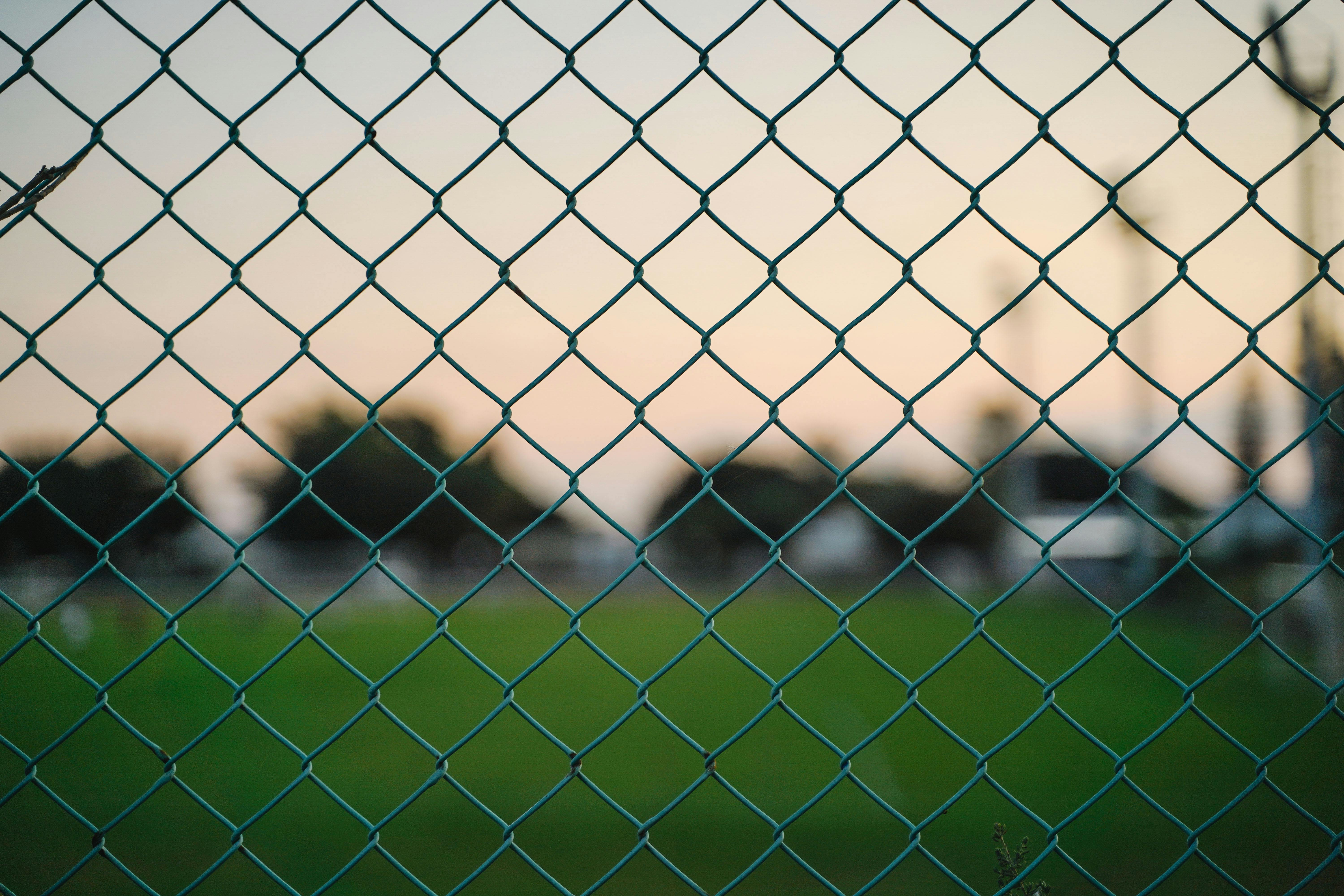 Selective Focus Photography Of Fence · Free Stock Photo