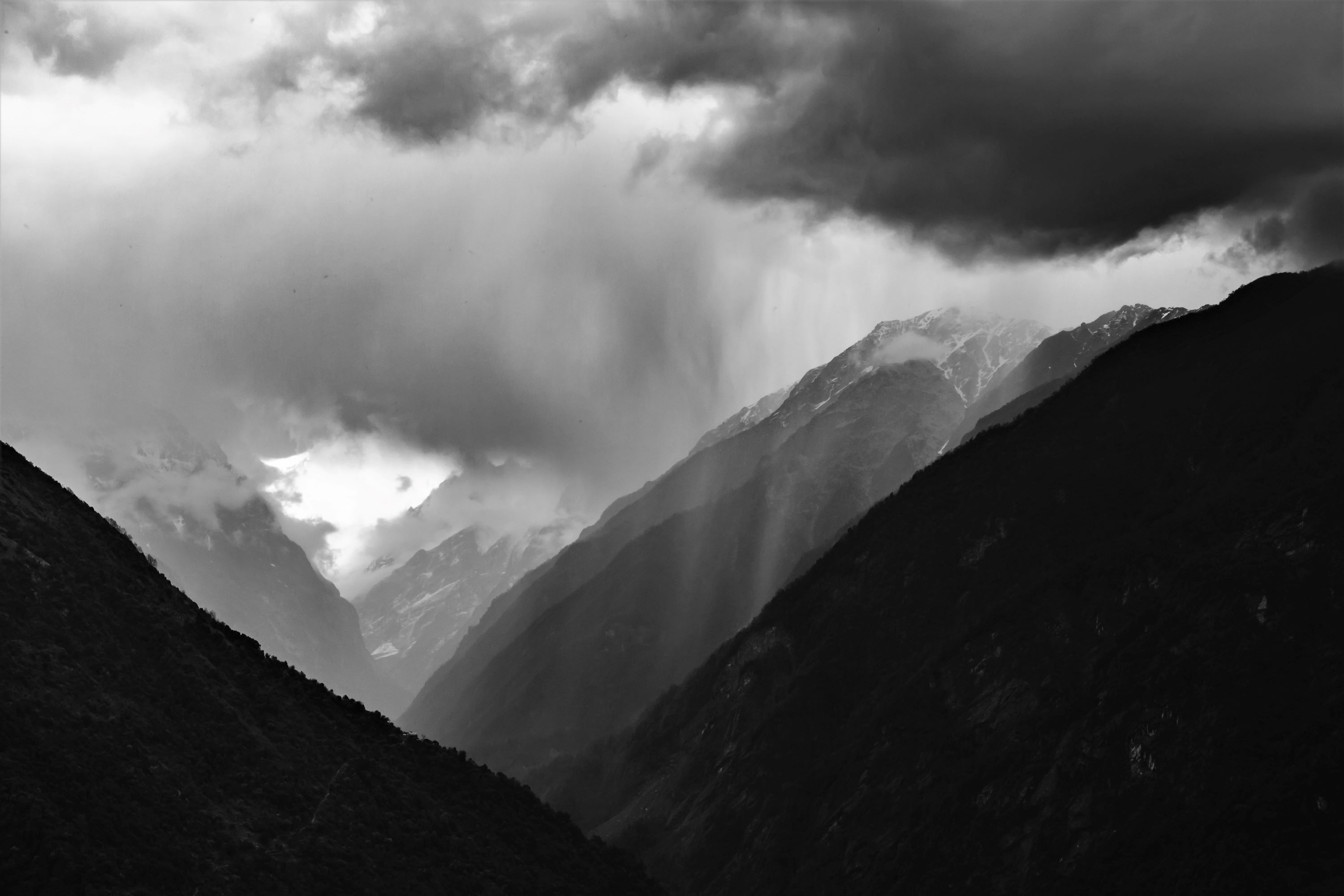 Grayscale Photo of Mountains · Free Stock Photo