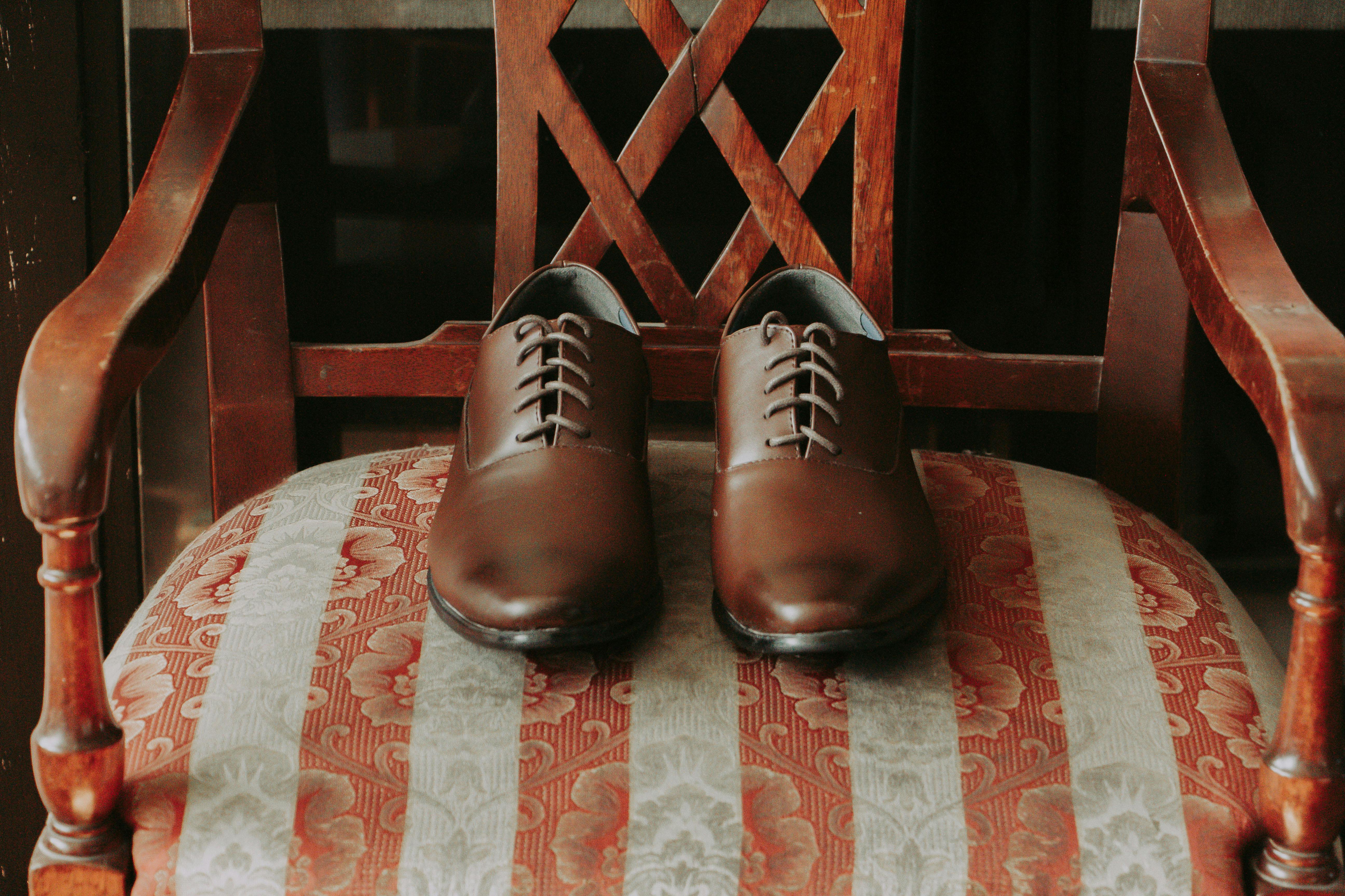 Brown Leather Shoes on a Chair · Free Stock Photo