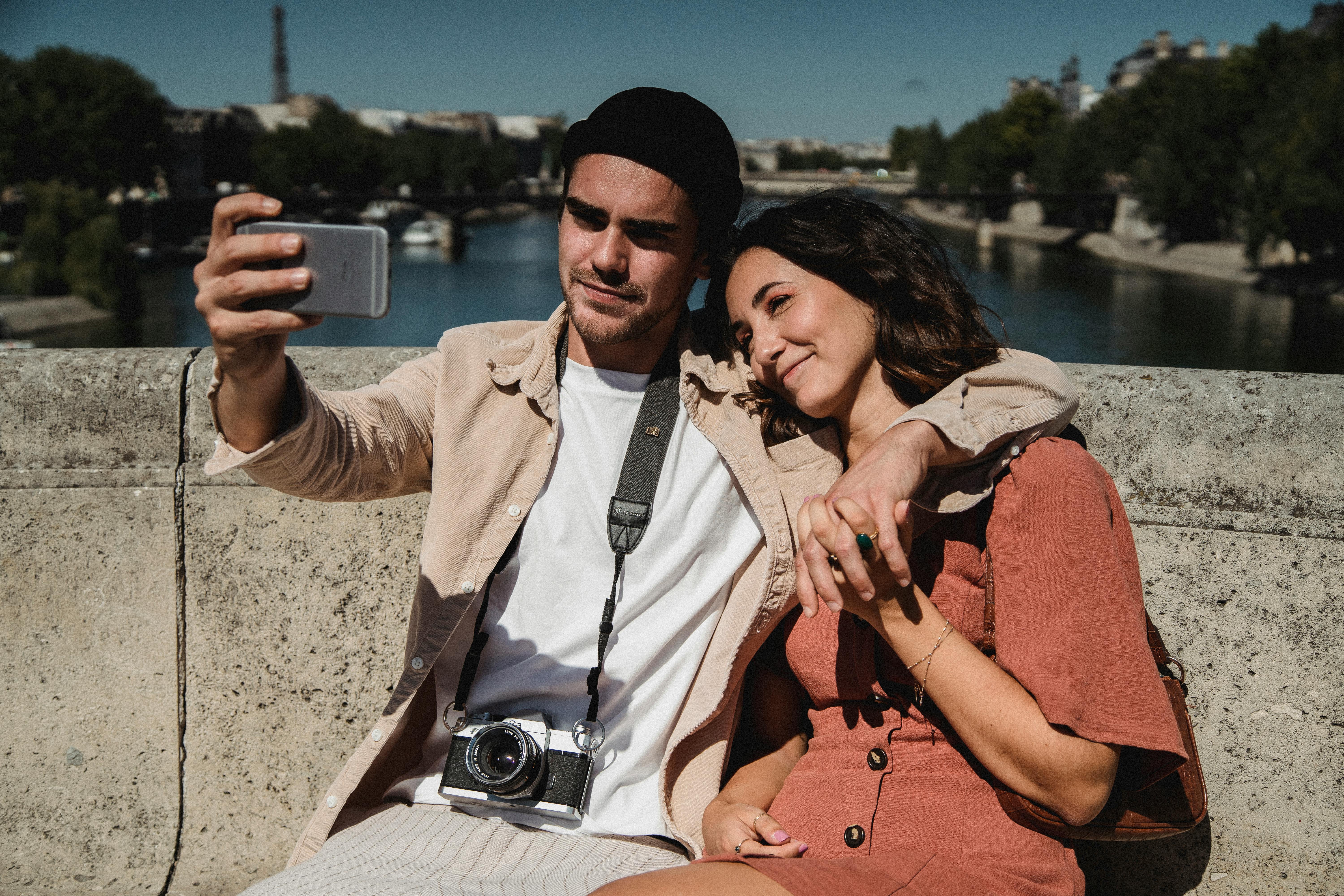 Couple Taking a Photo Together · Free Stock Photo