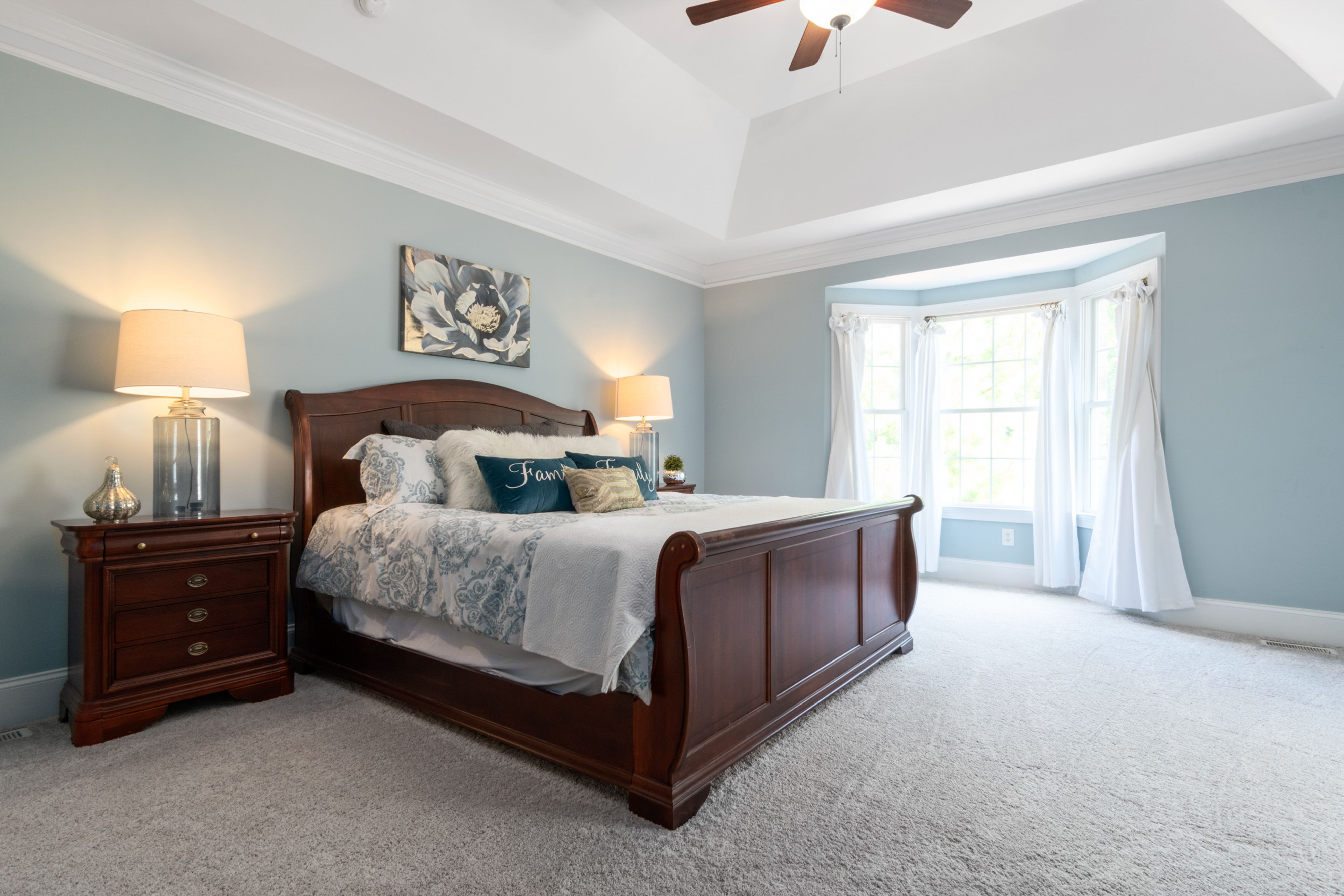 Brown Wooden Bed Frame in a Bedroom · Free Stock Photo