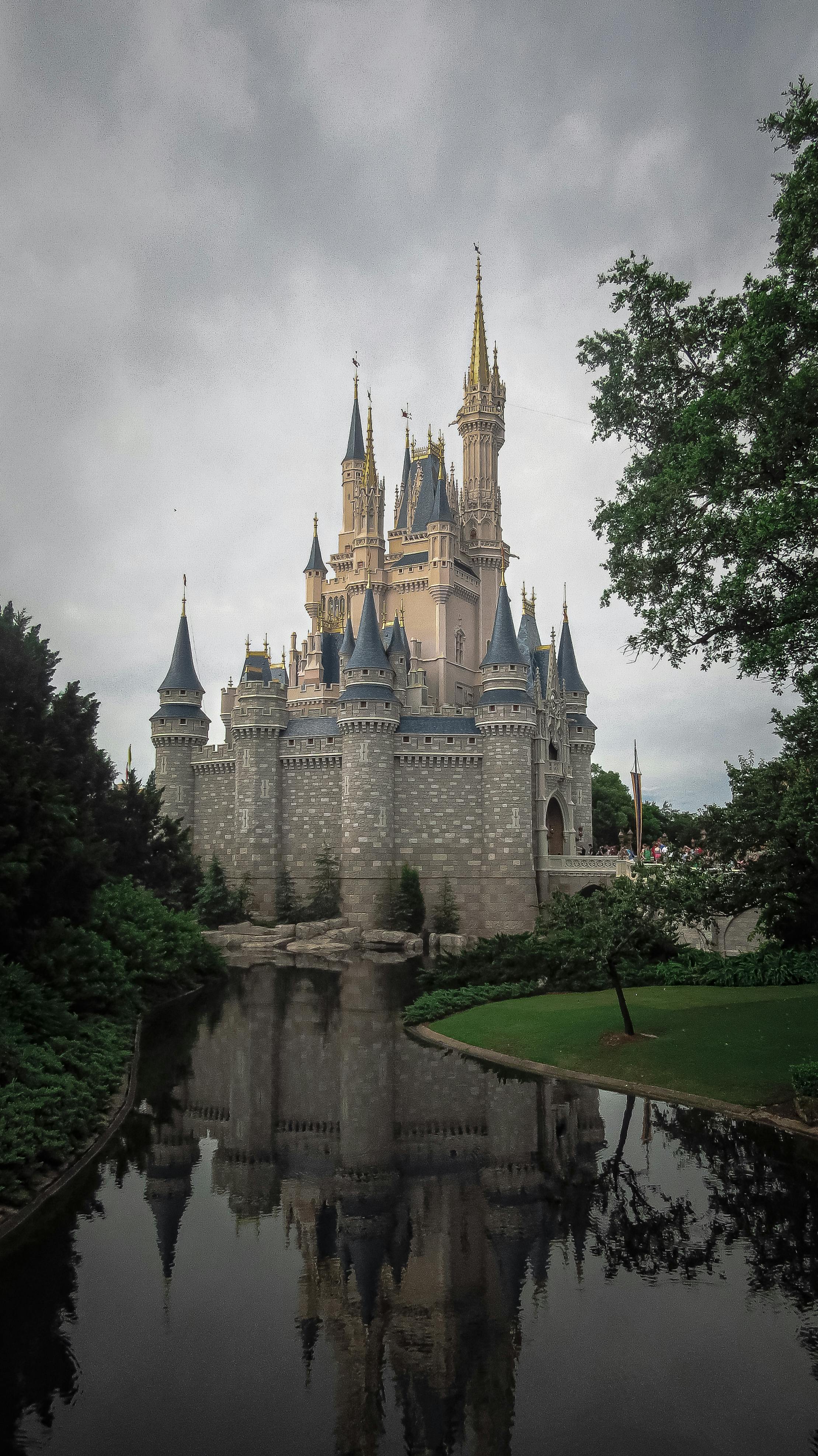 Disney Castle Under Cloudy Sky · Free Stock Photo