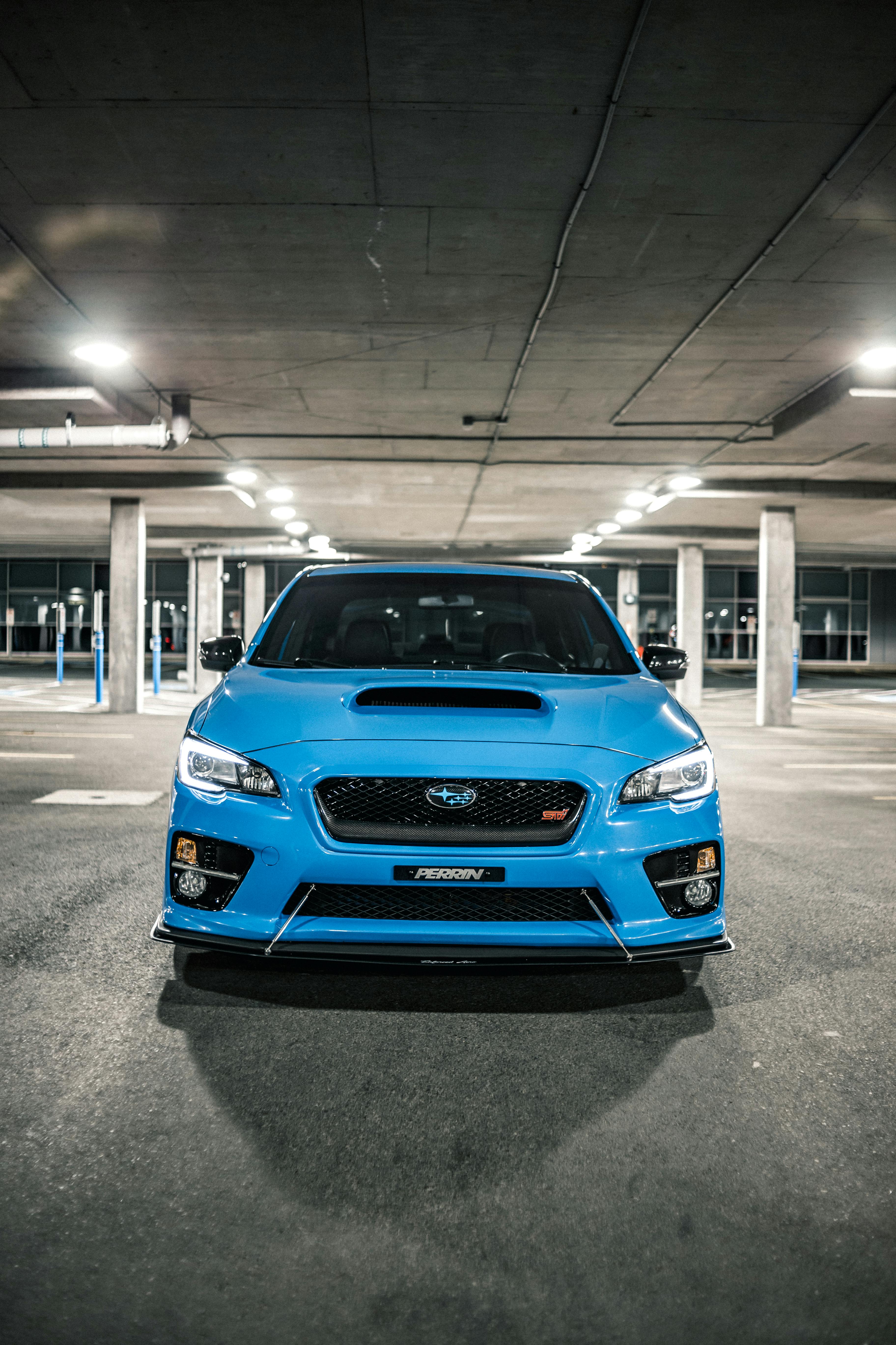 Modern blue car on parking lot · Free Stock Photo