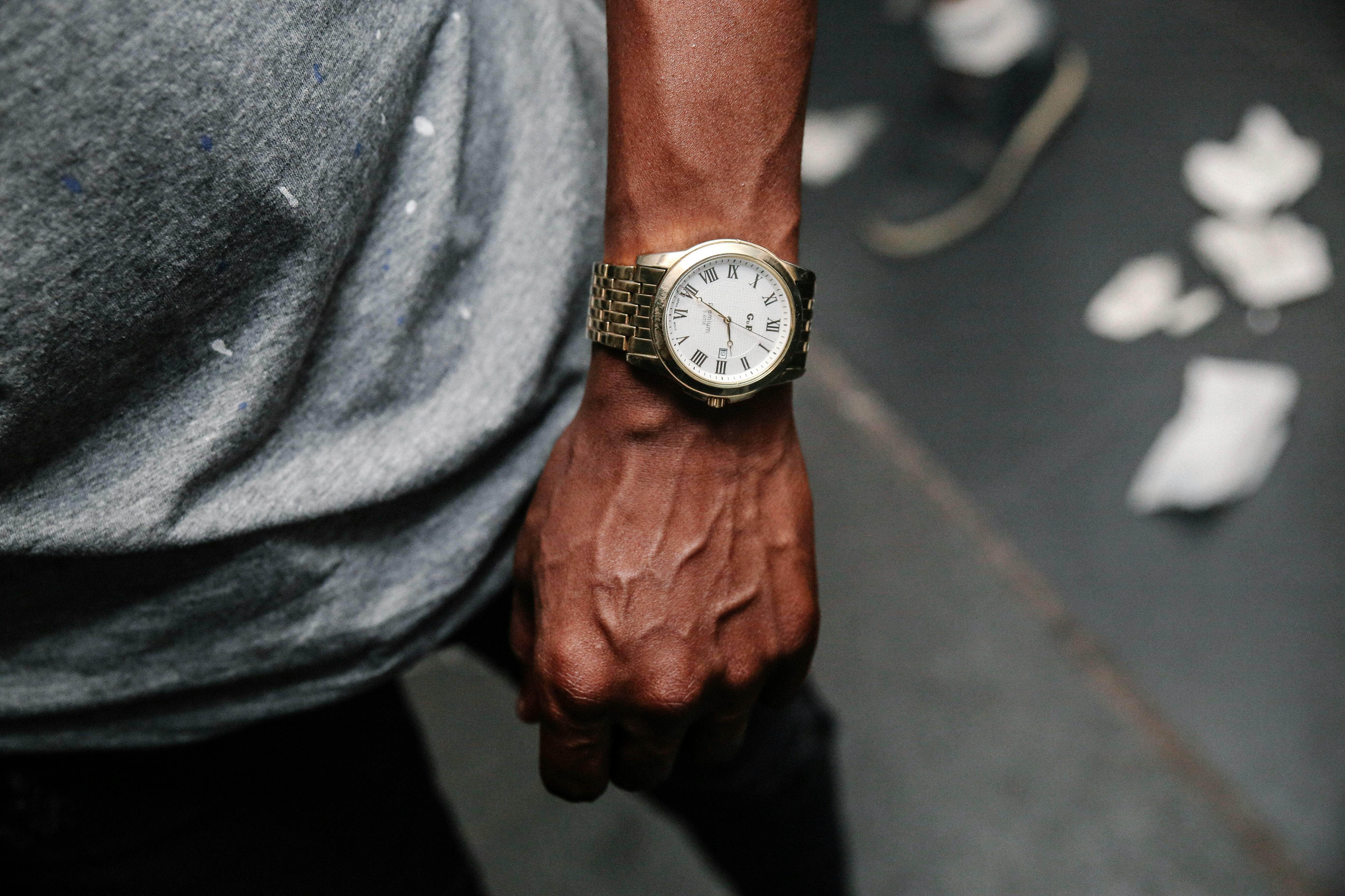 Person Wearing Black Analog Watch · Free Stock Photo