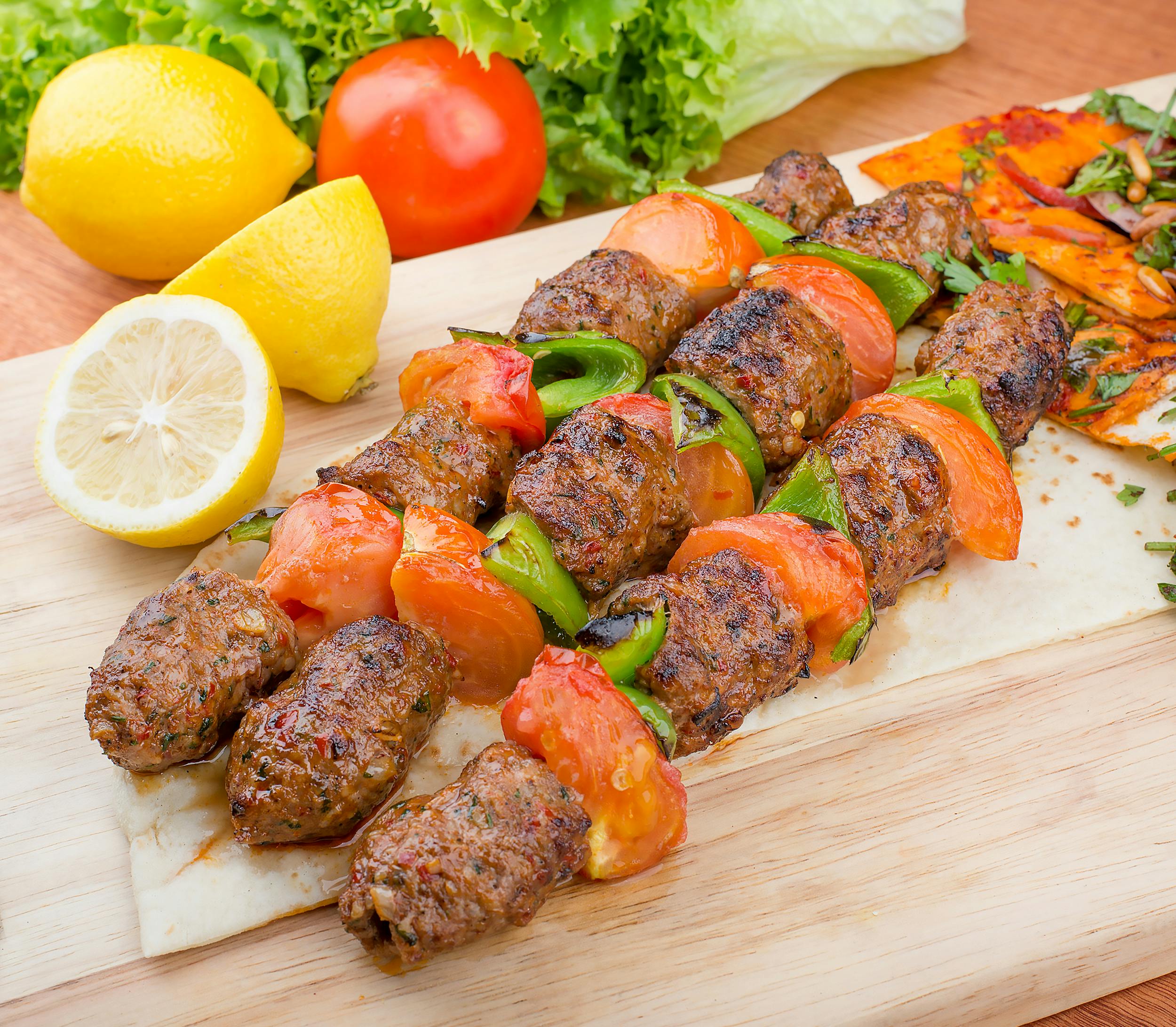 Kebab on Flatbread · Free Stock Photo