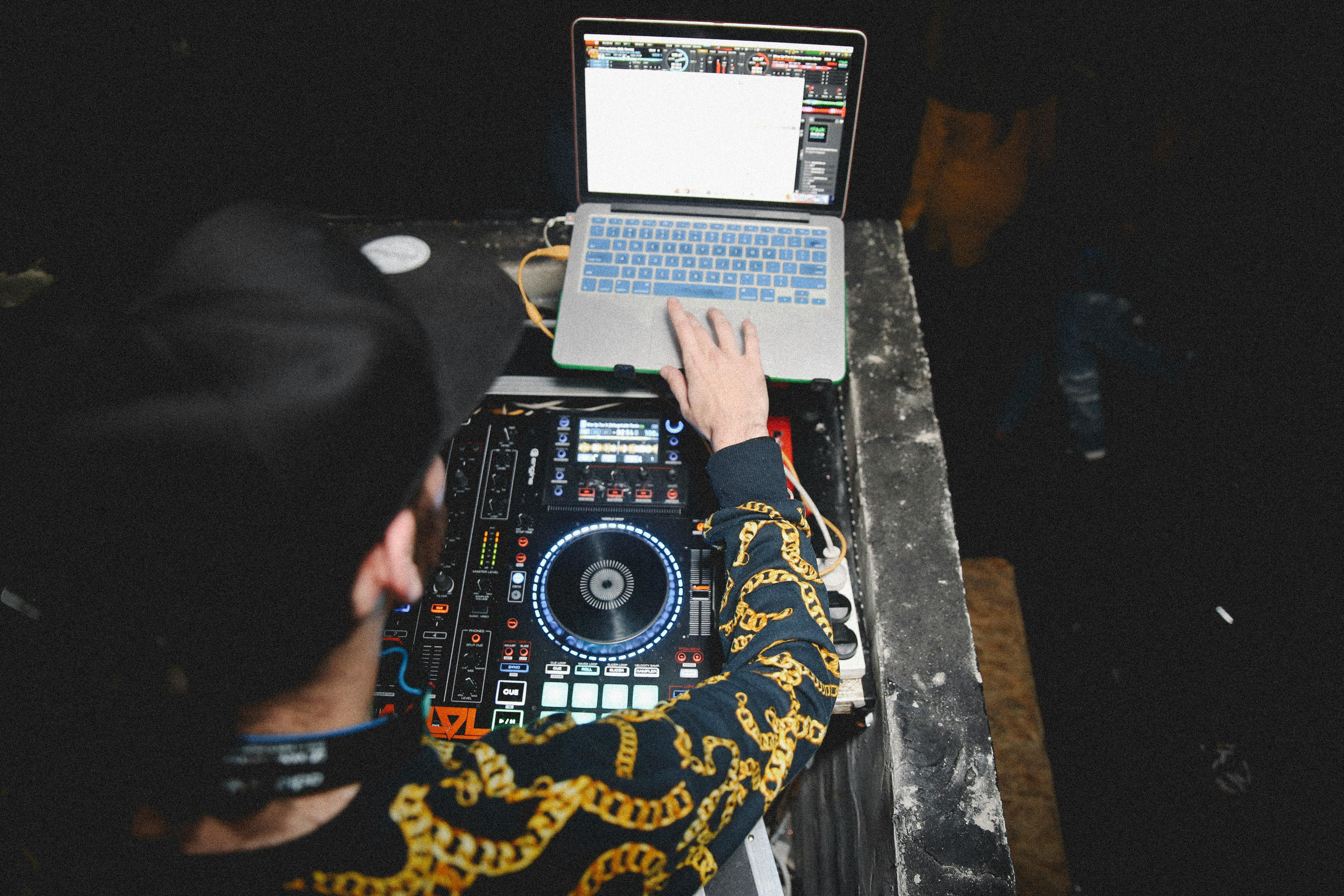 Man Creating Music on a Console · Free Stock Photo