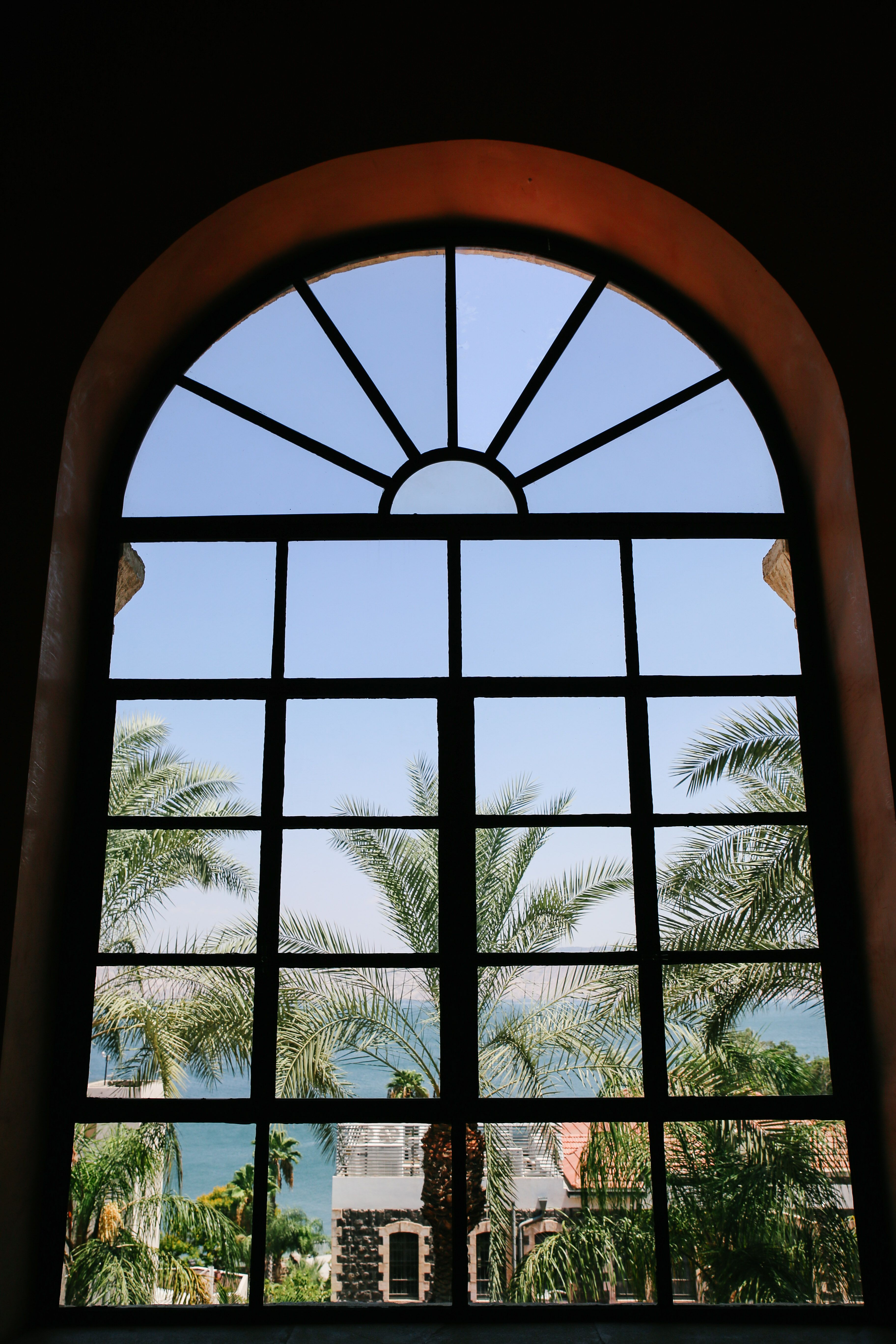 Seaside Seen through Window · Free Stock Photo