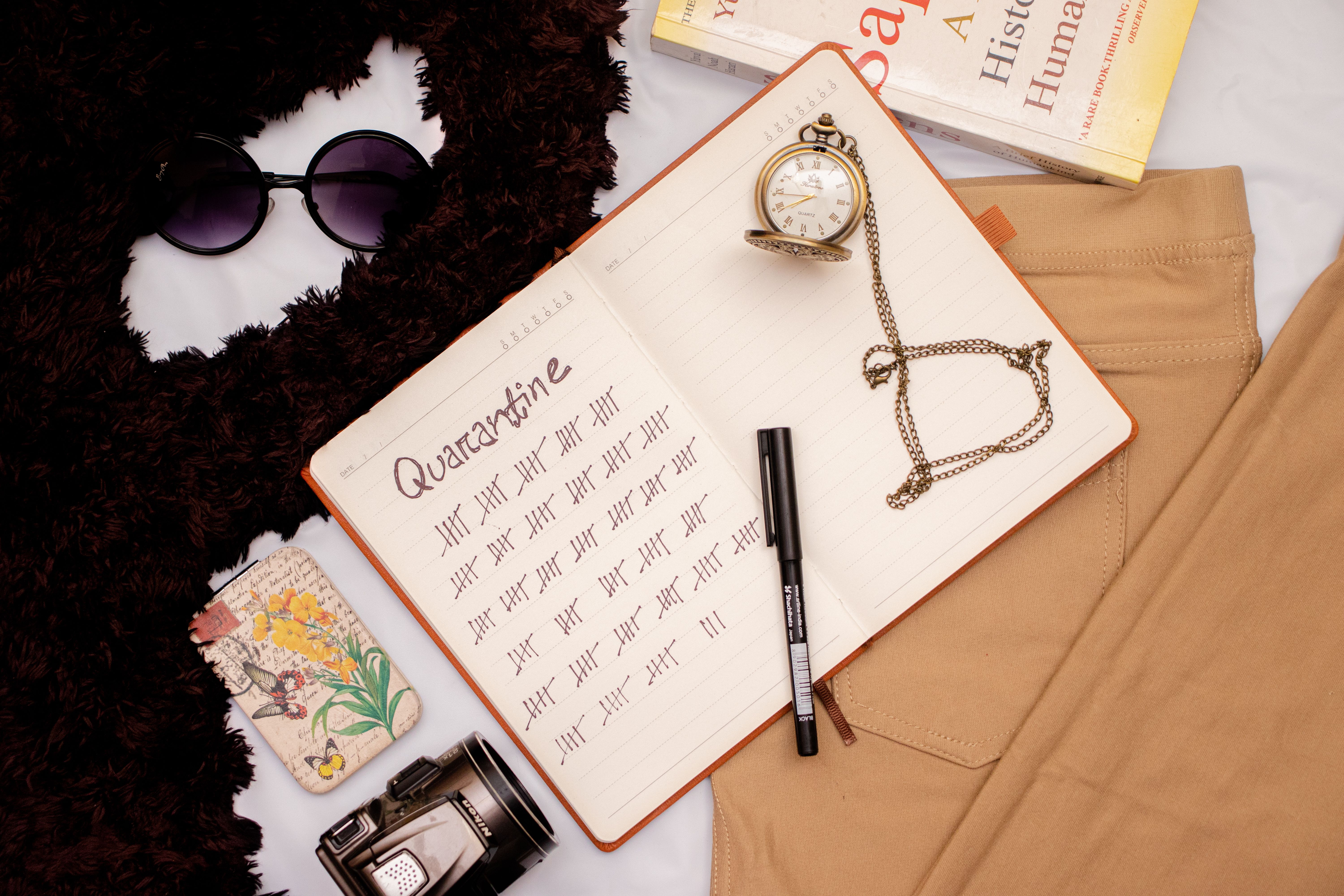 Watch and Marker on Notepad · Free Stock Photo