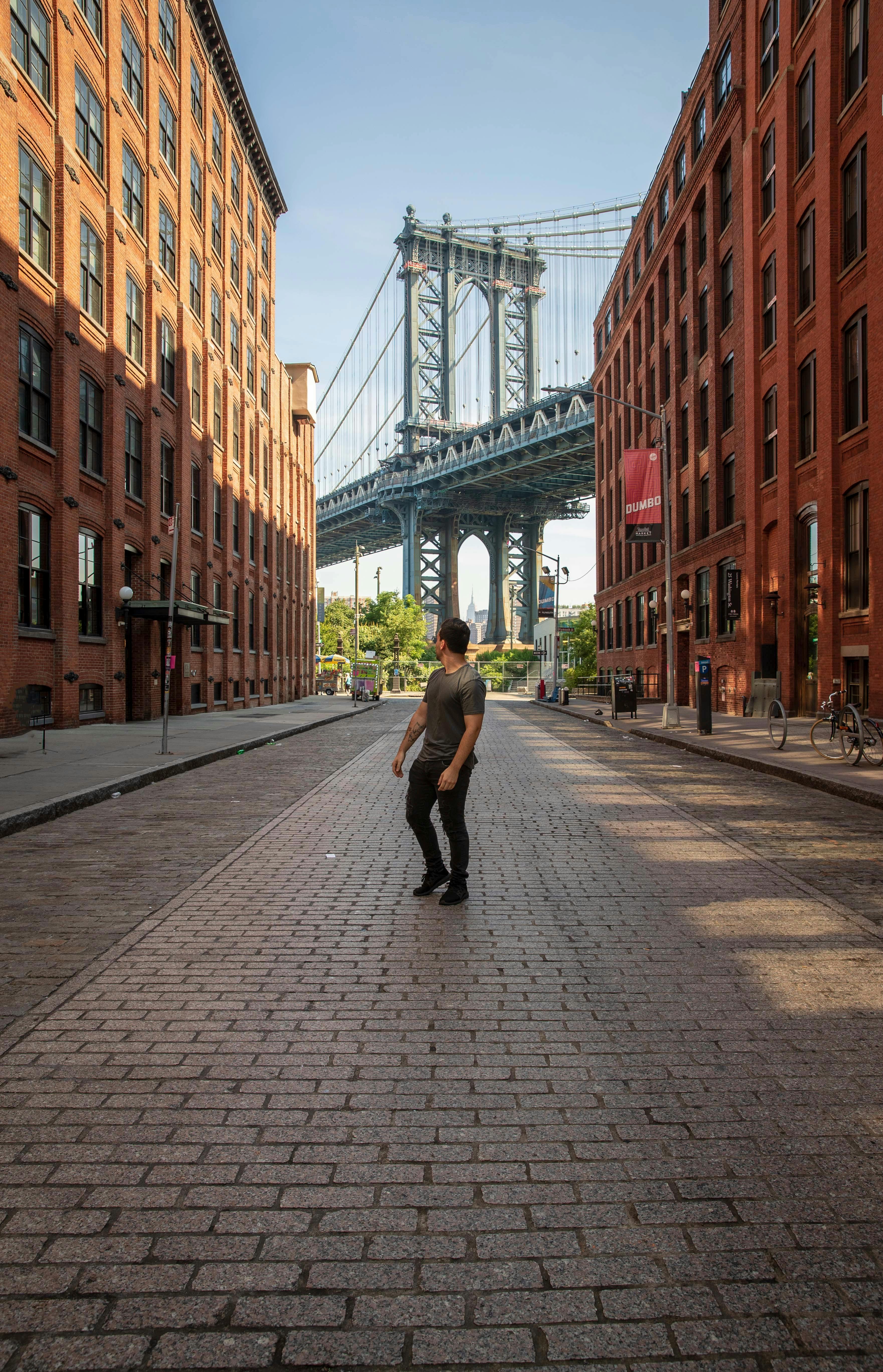 Man Looking Back at Bridge · Free Stock Photo