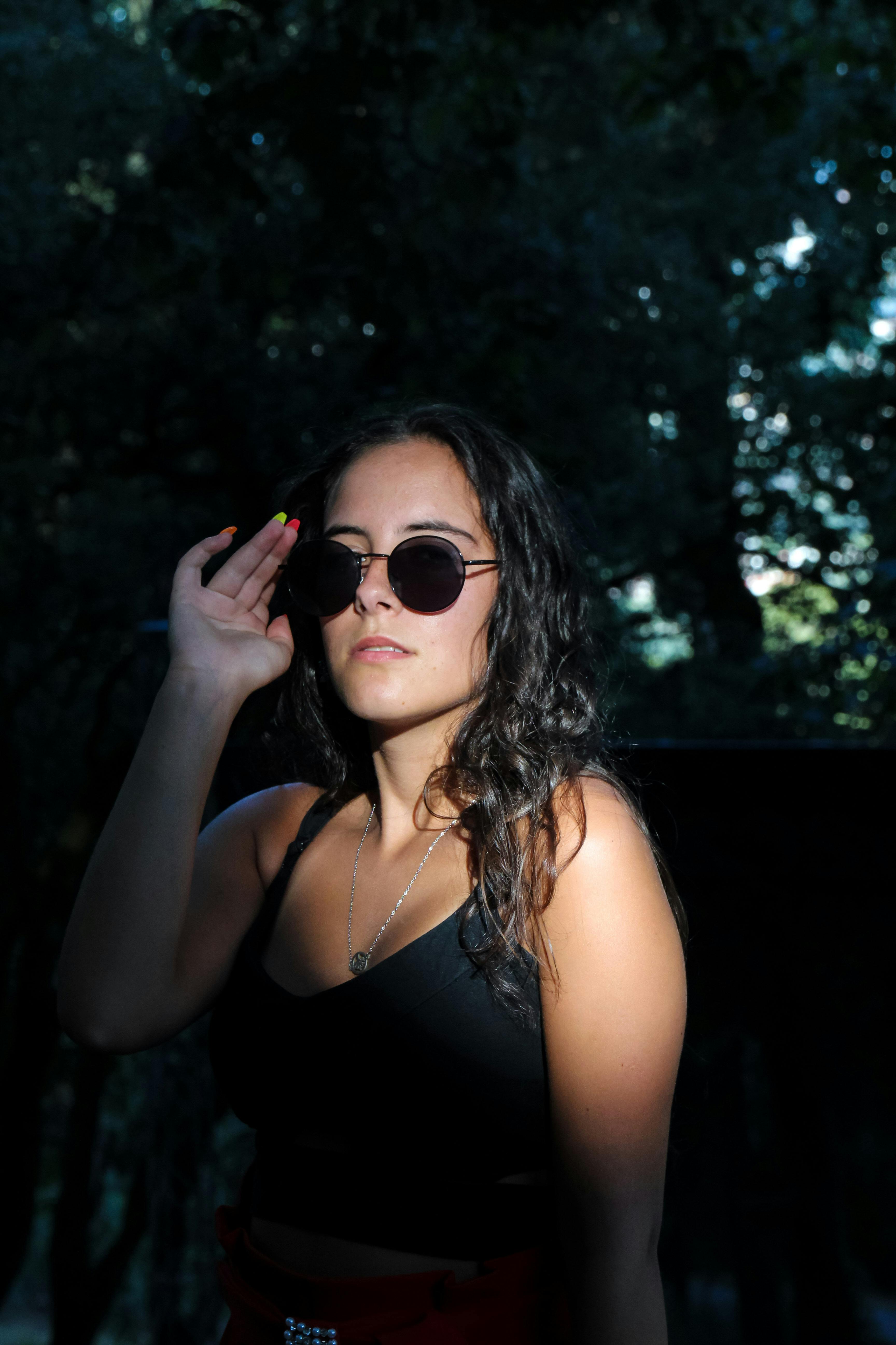 A Beautiful Woman in White Spaghetti Strap Top and Pink Coat · Free ...