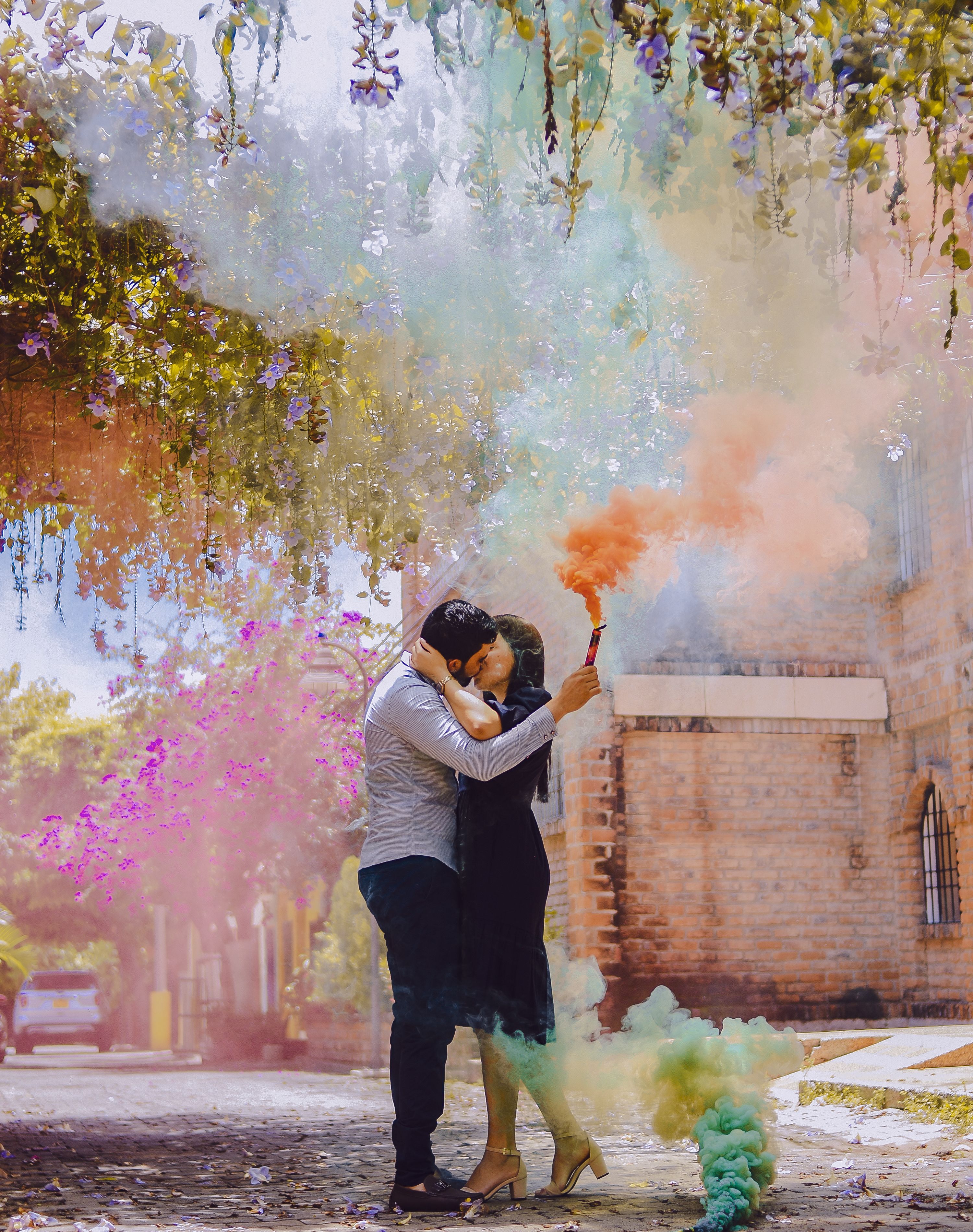 Woman Holding a Flare on a Street · Free Stock Photo