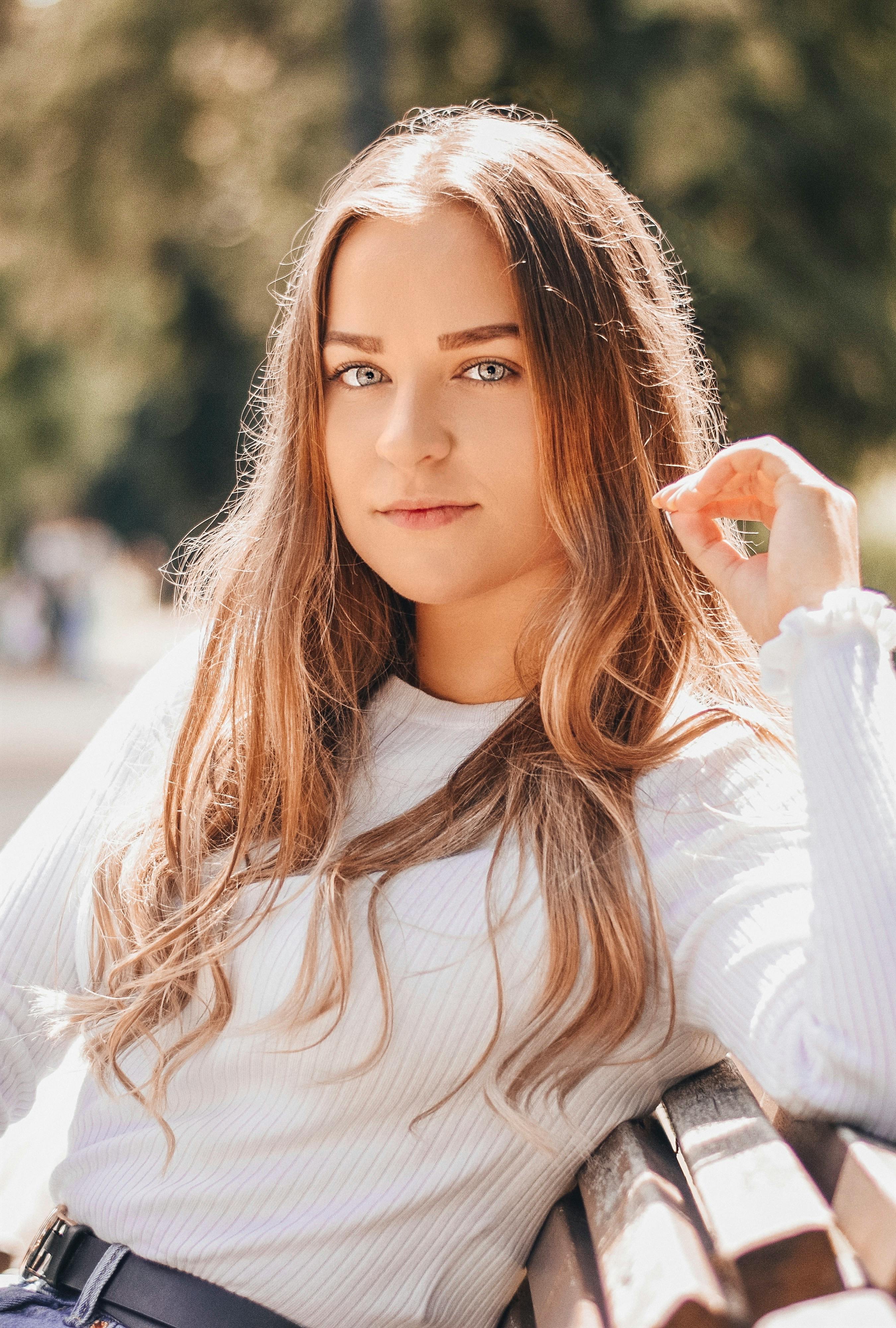 Young Woman Posing Shirtless in Jacket Outdoors · Free Stock Photo