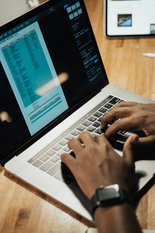 Person Using Macbook Pro · Free Stock Photo Person Using Macbook Pro · Free Stock Photo