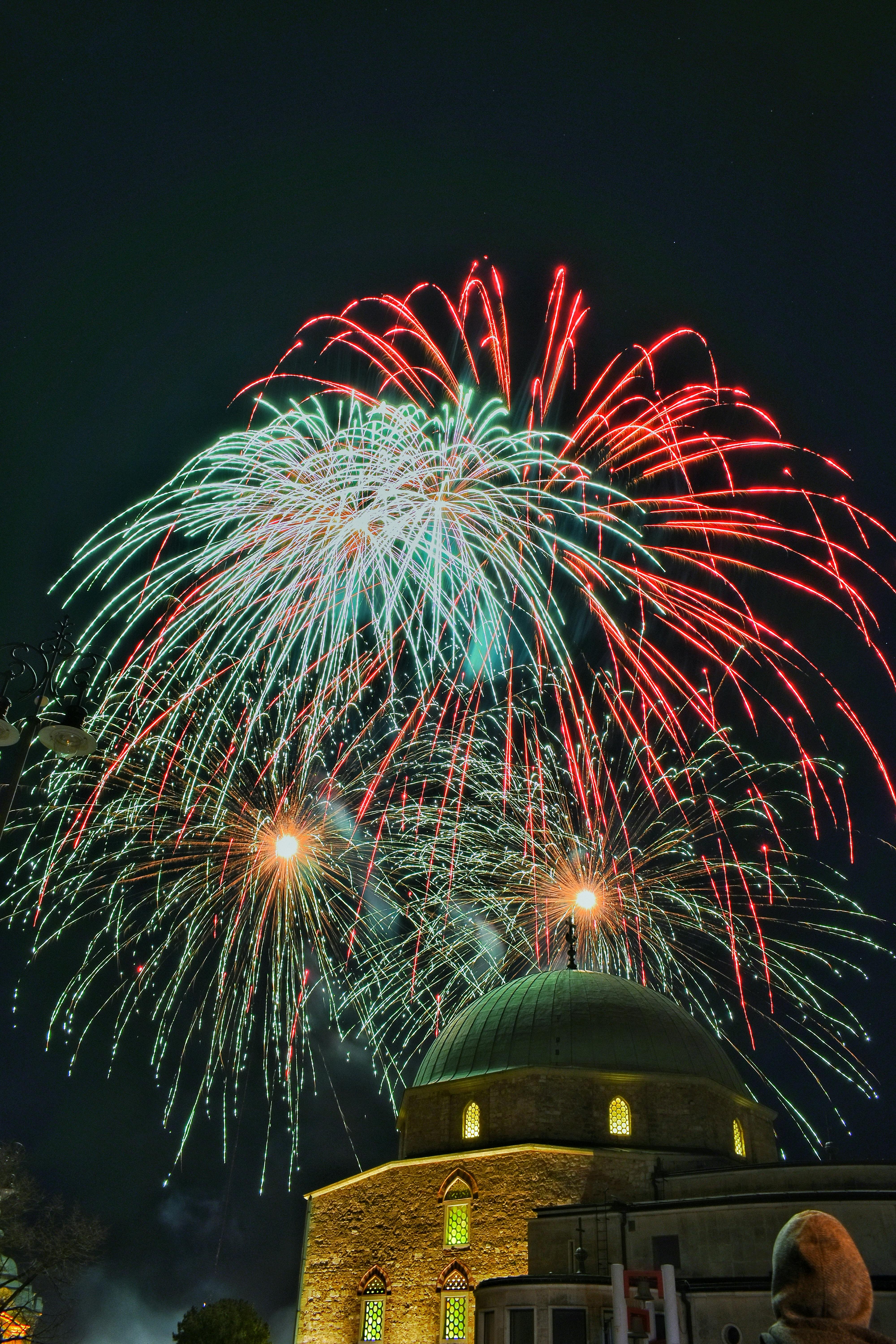 Beautiful Aerial Fireworks Above Dome Building · Free Stock Photo