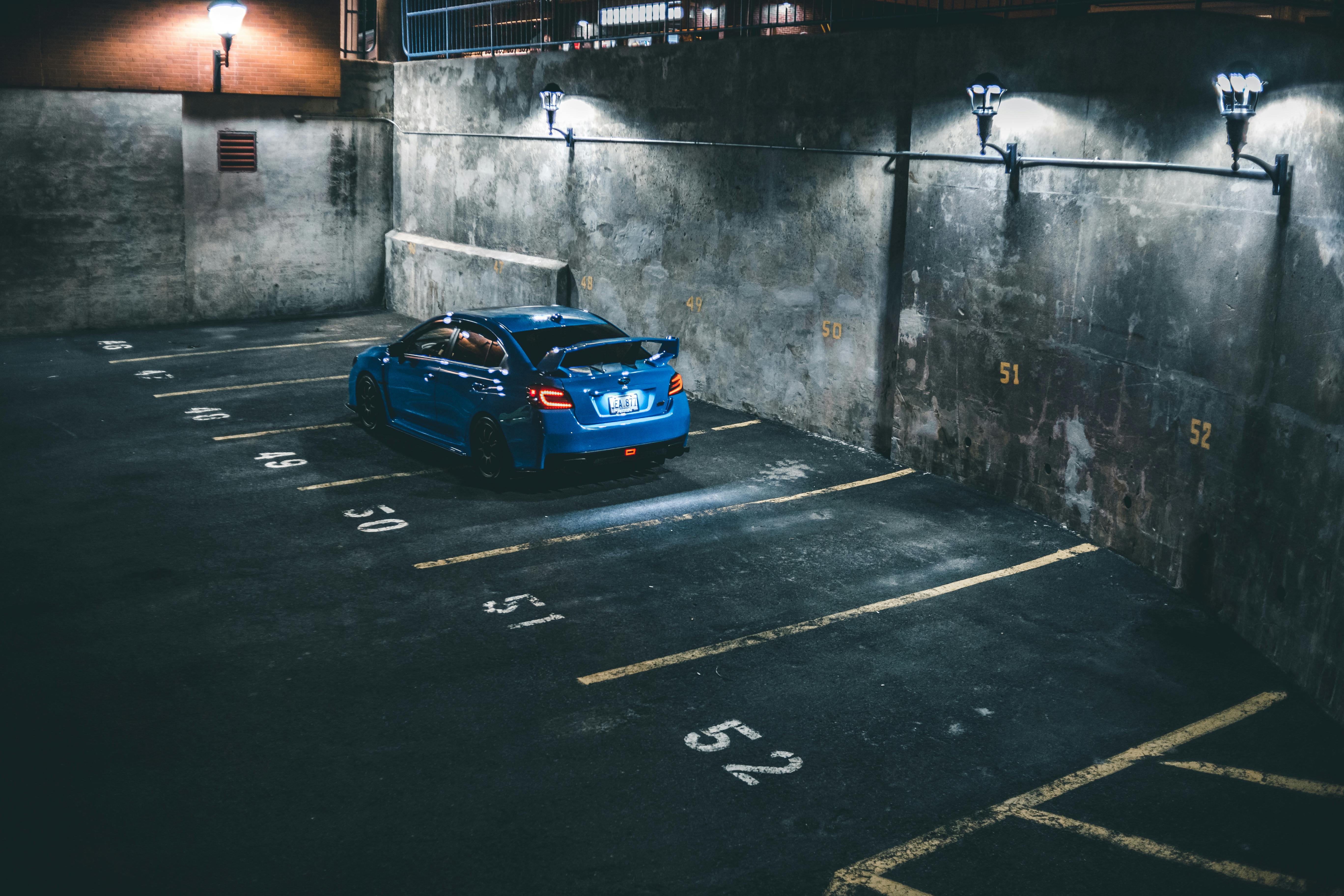 Blue car on parking lot · Free Stock Photo