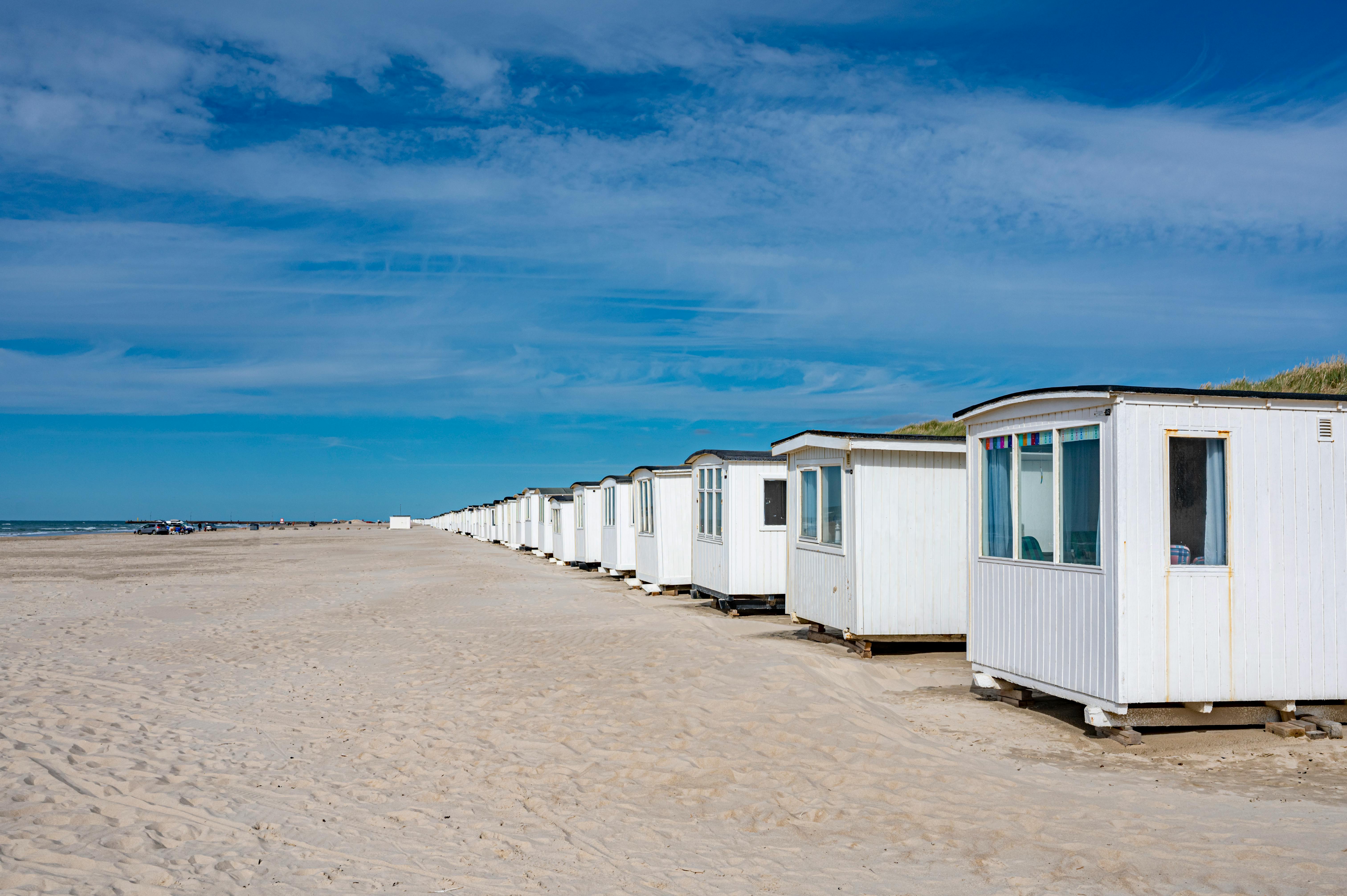Small Beach Houses on Sand Seashore · Free Stock Photo
