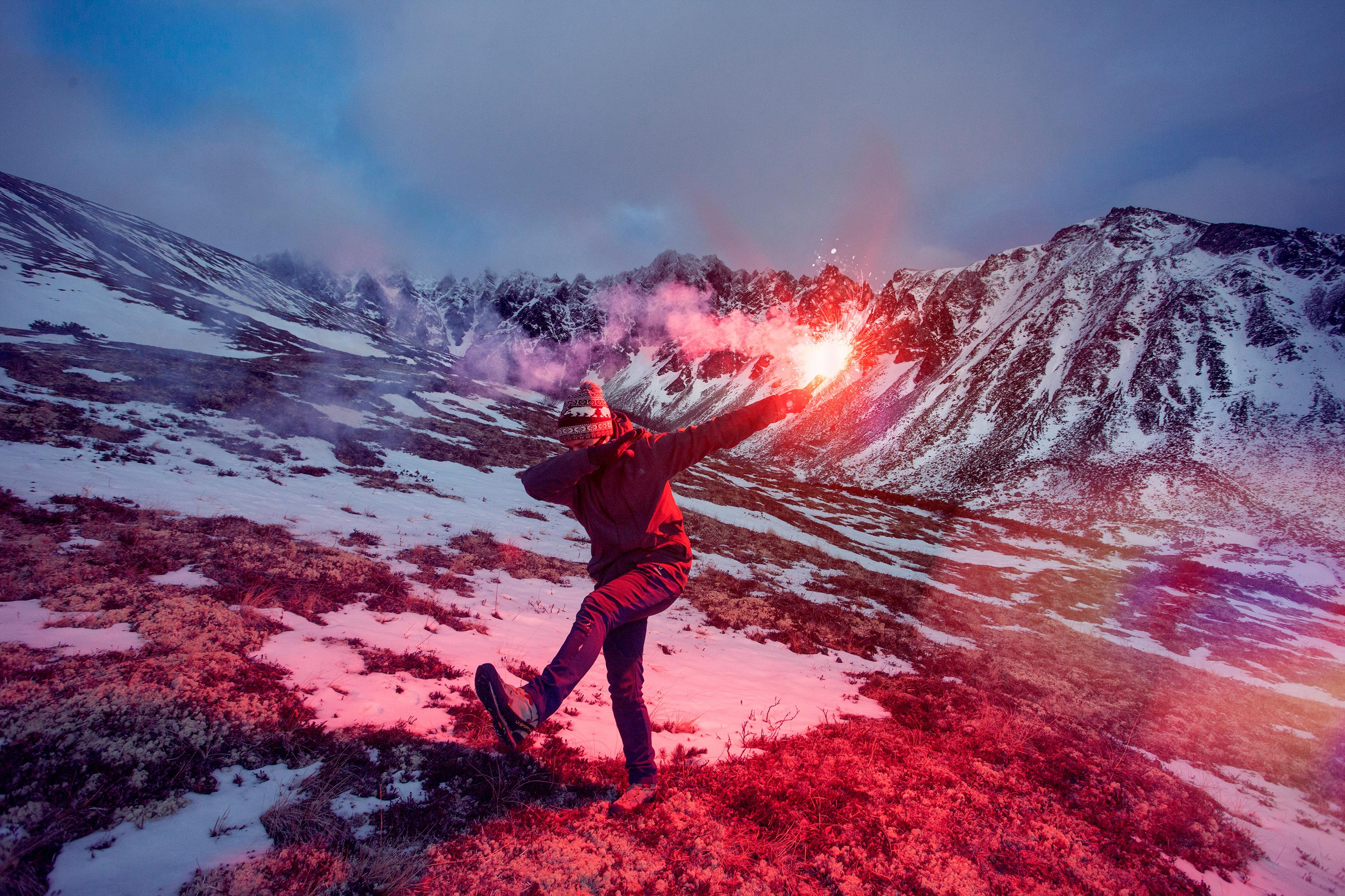 A Man Dabbing while Holding a Flare · Free Stock Photo