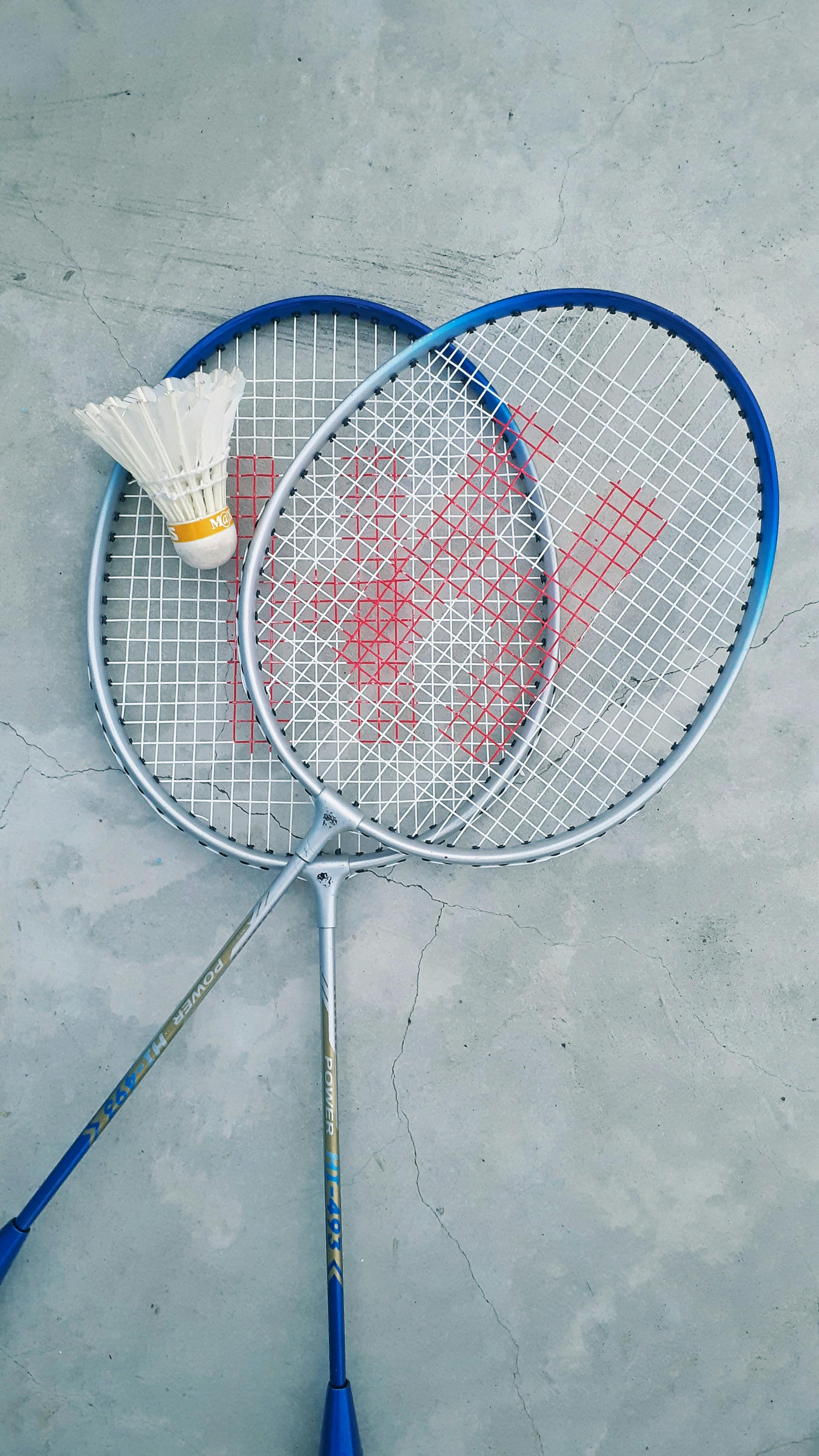 Women Holding Badminton Rackets · Free Stock Photo