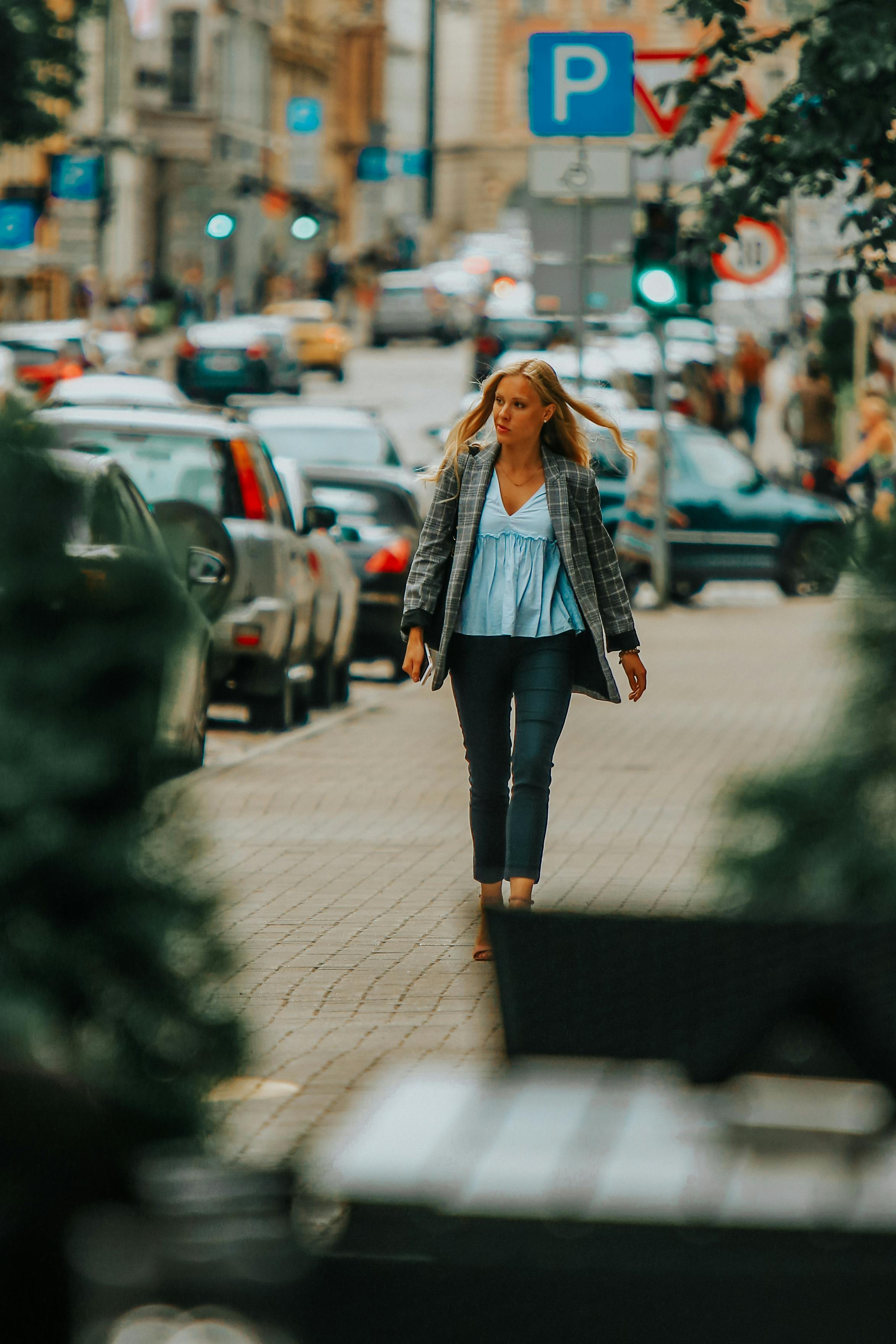 A Woman Walking on the Street · Free Stock Photo