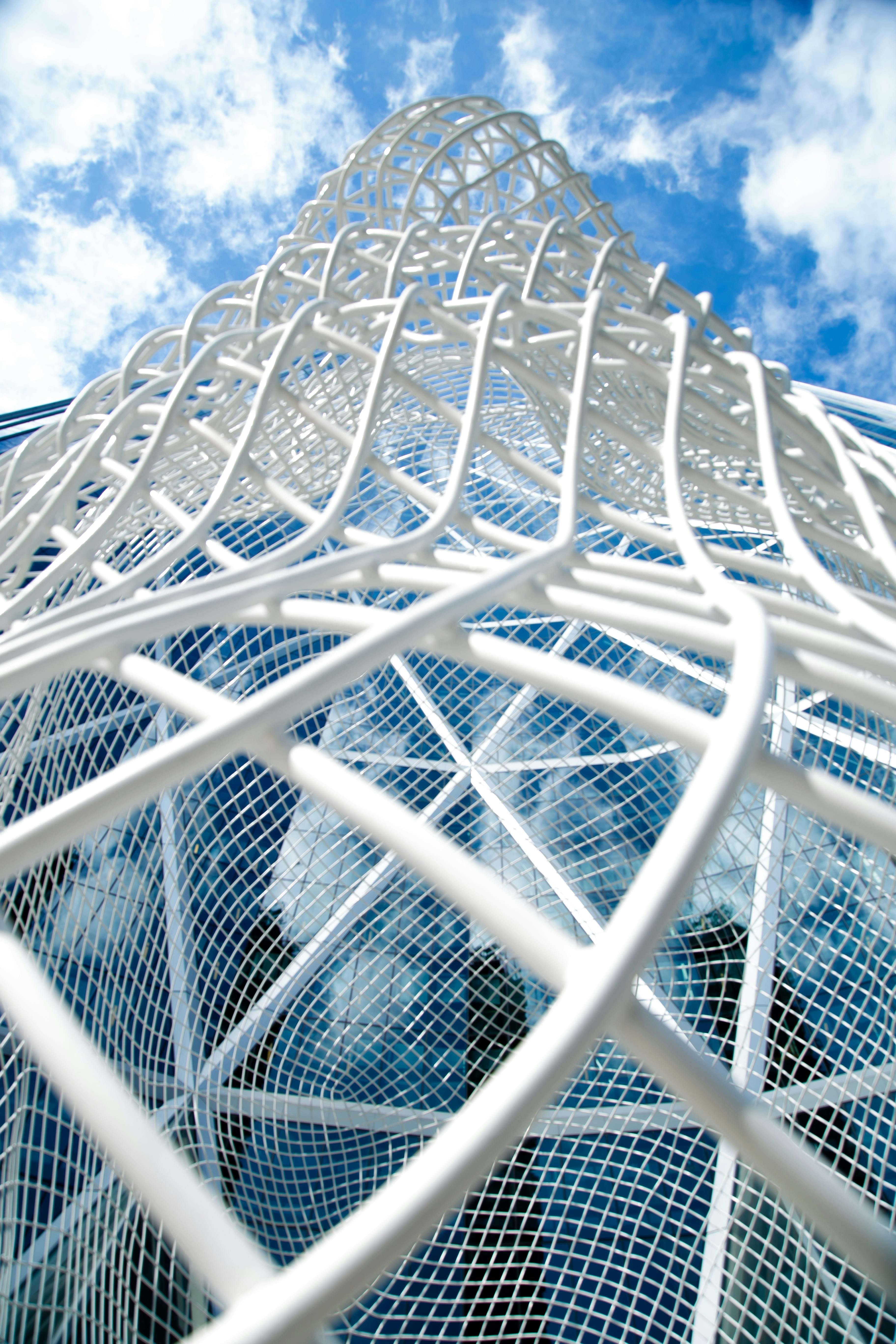 Modern building facade with geometric shapes · Free Stock Photo