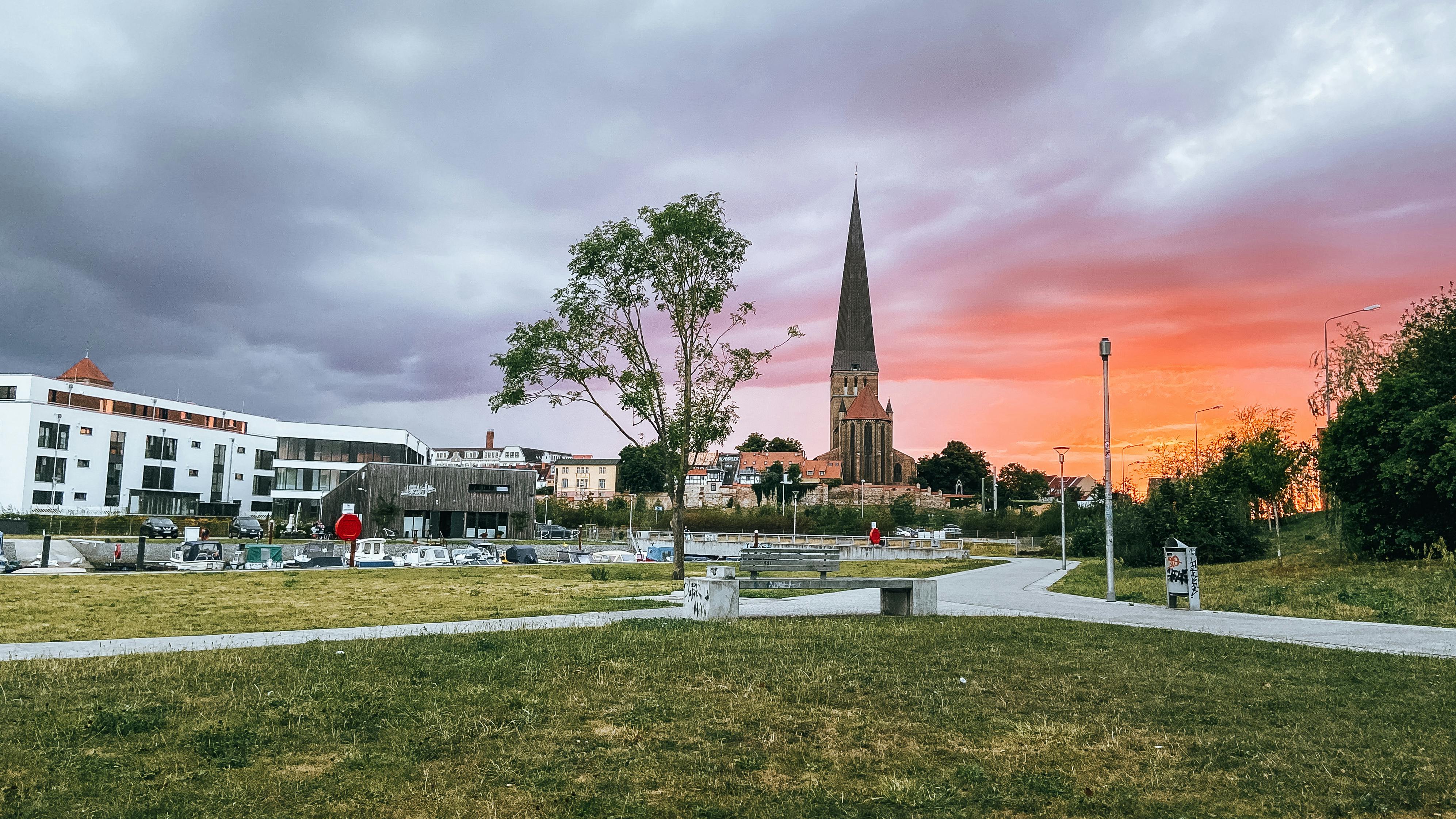 A Brick Building With Spire · Free Stock Photo