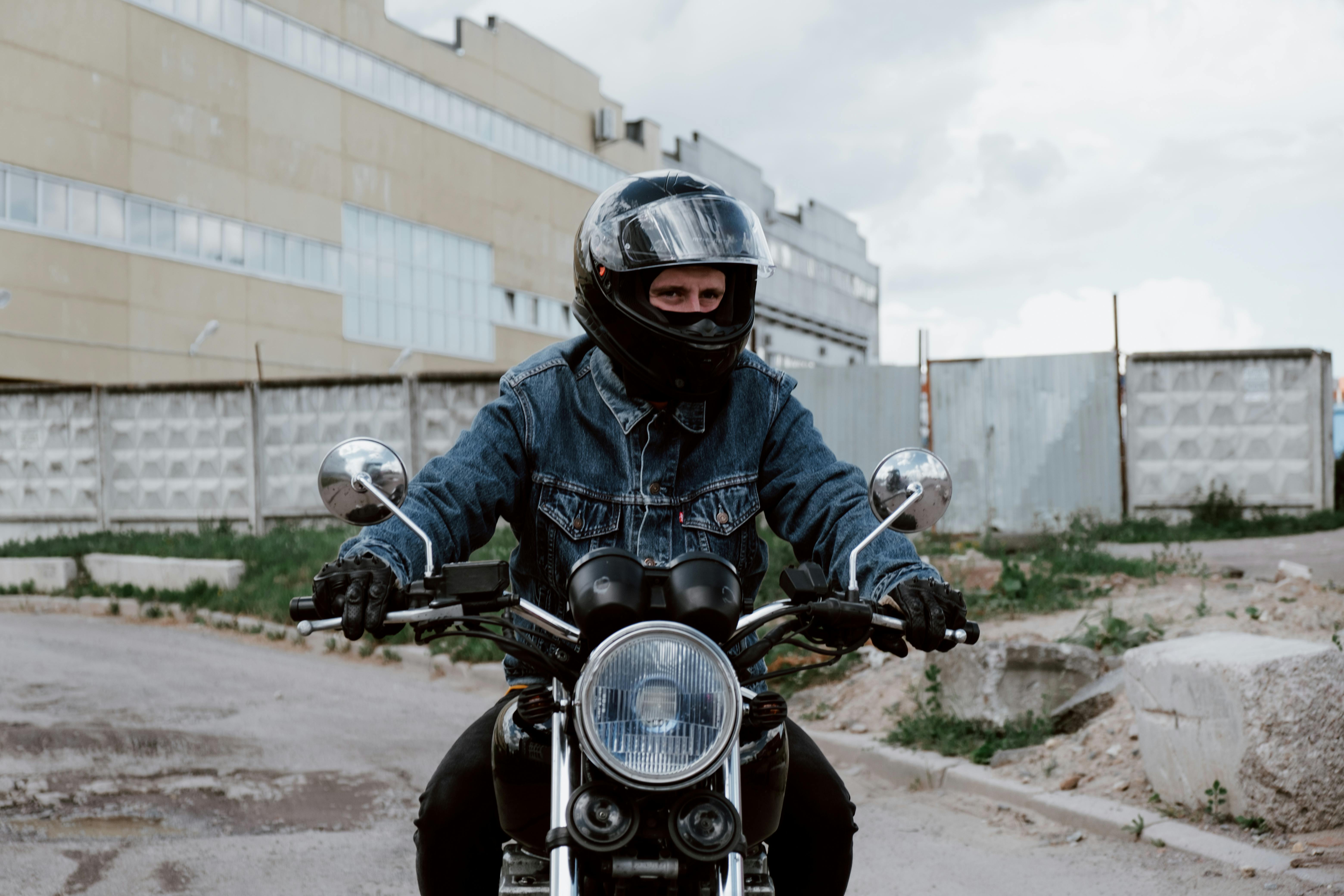 Person Wearing Motorcycle Helmet · Free Stock Photo