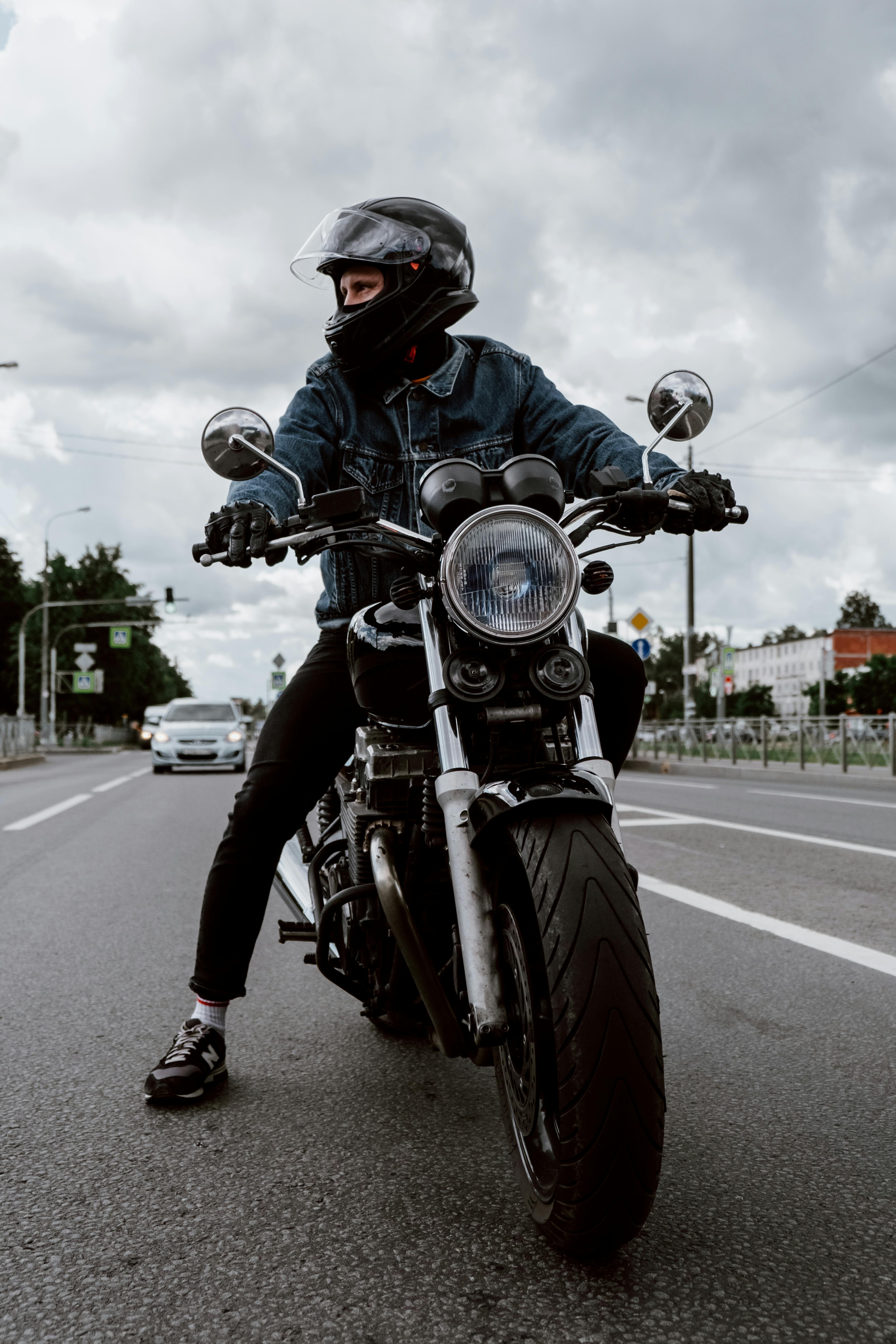 A Man Riding Motorcycle on the Road · Free Stock Photo