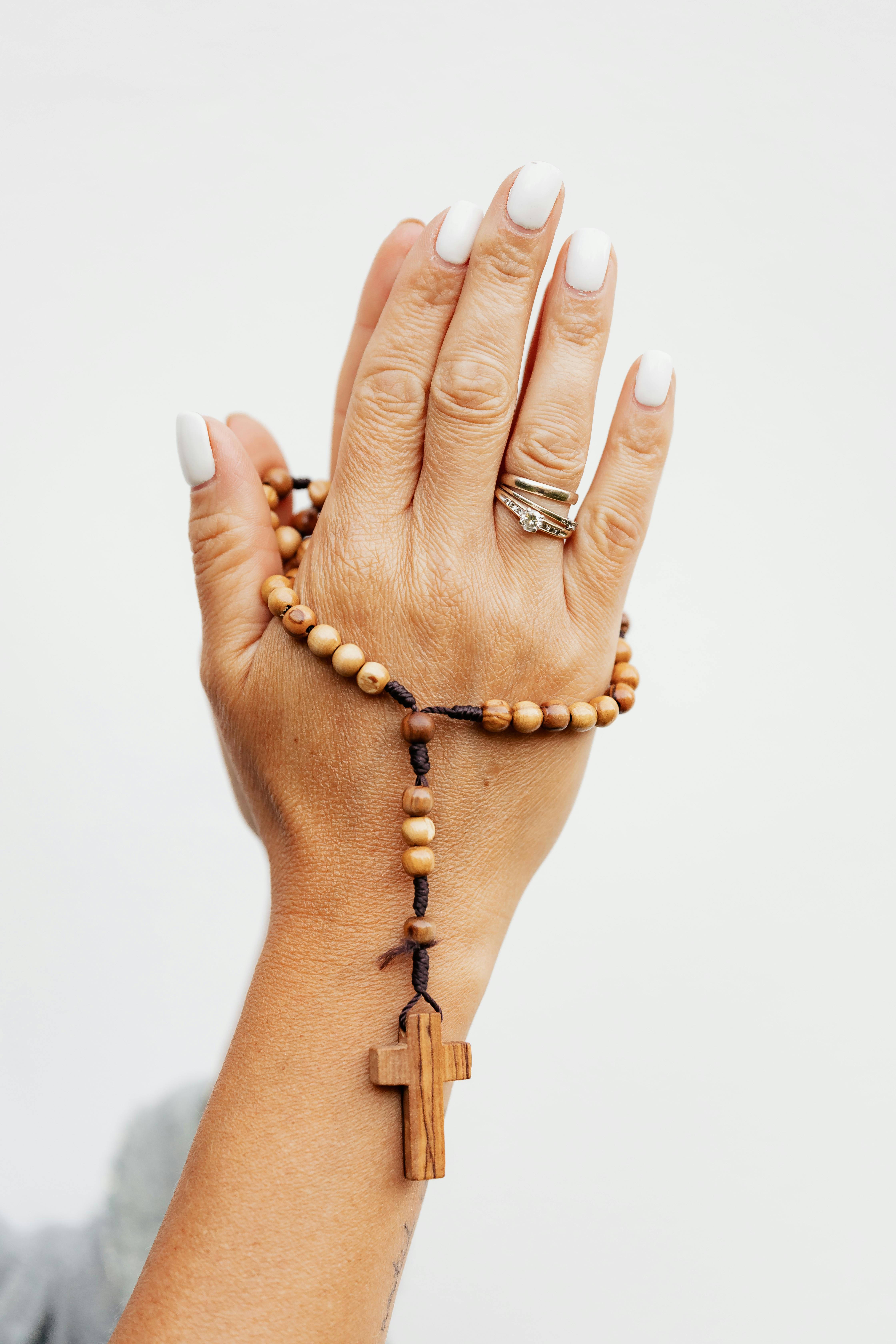 A Praying Hands with Rosary · Free Stock Photo