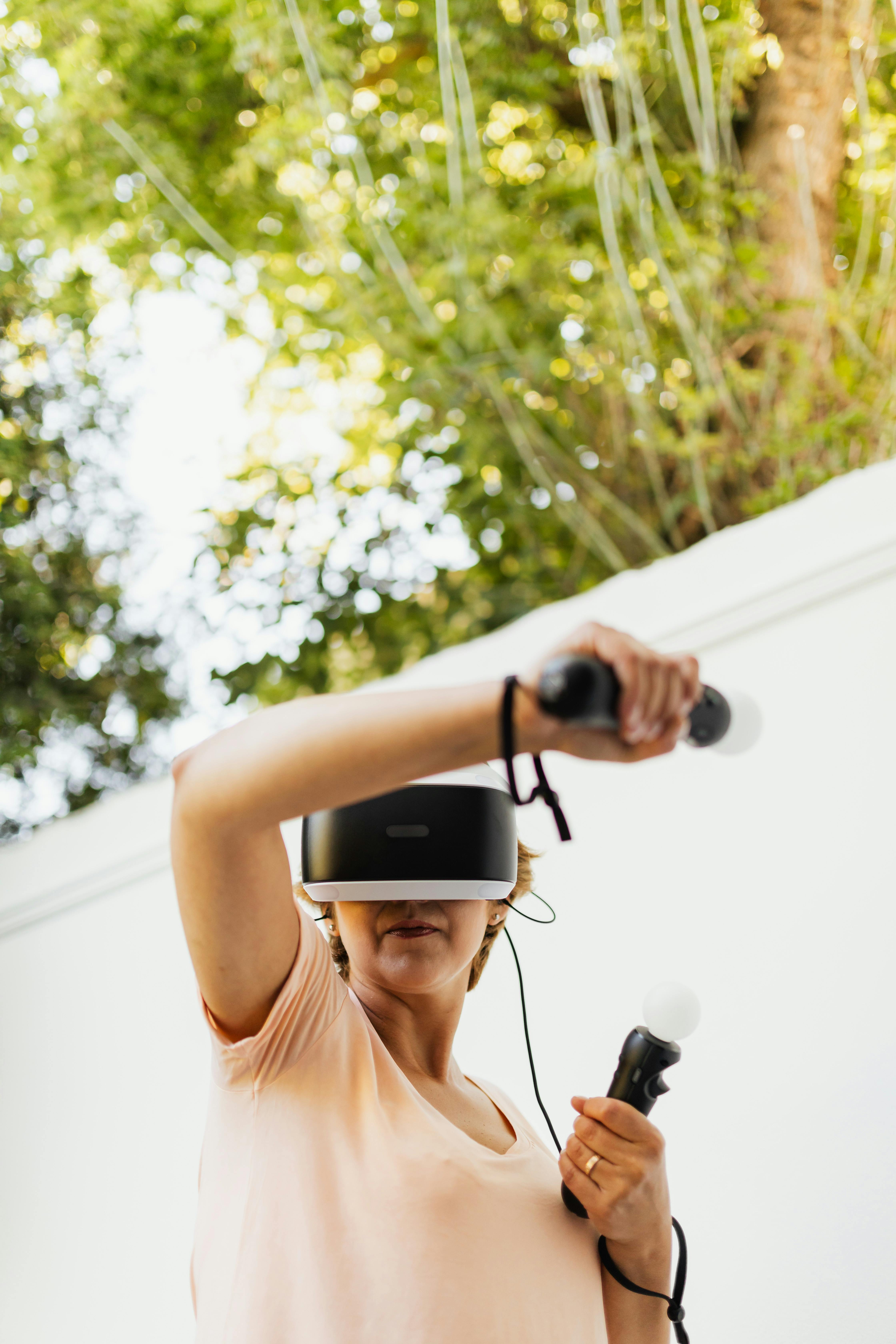 Two People Playing a Virtual Reality Game · Free Stock Photo