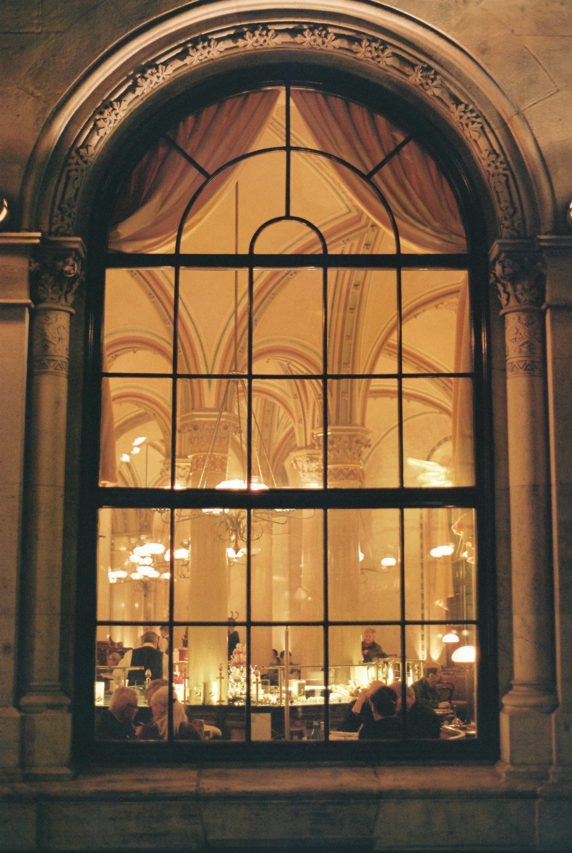 Ornamental glass window of building · Free Stock Photo