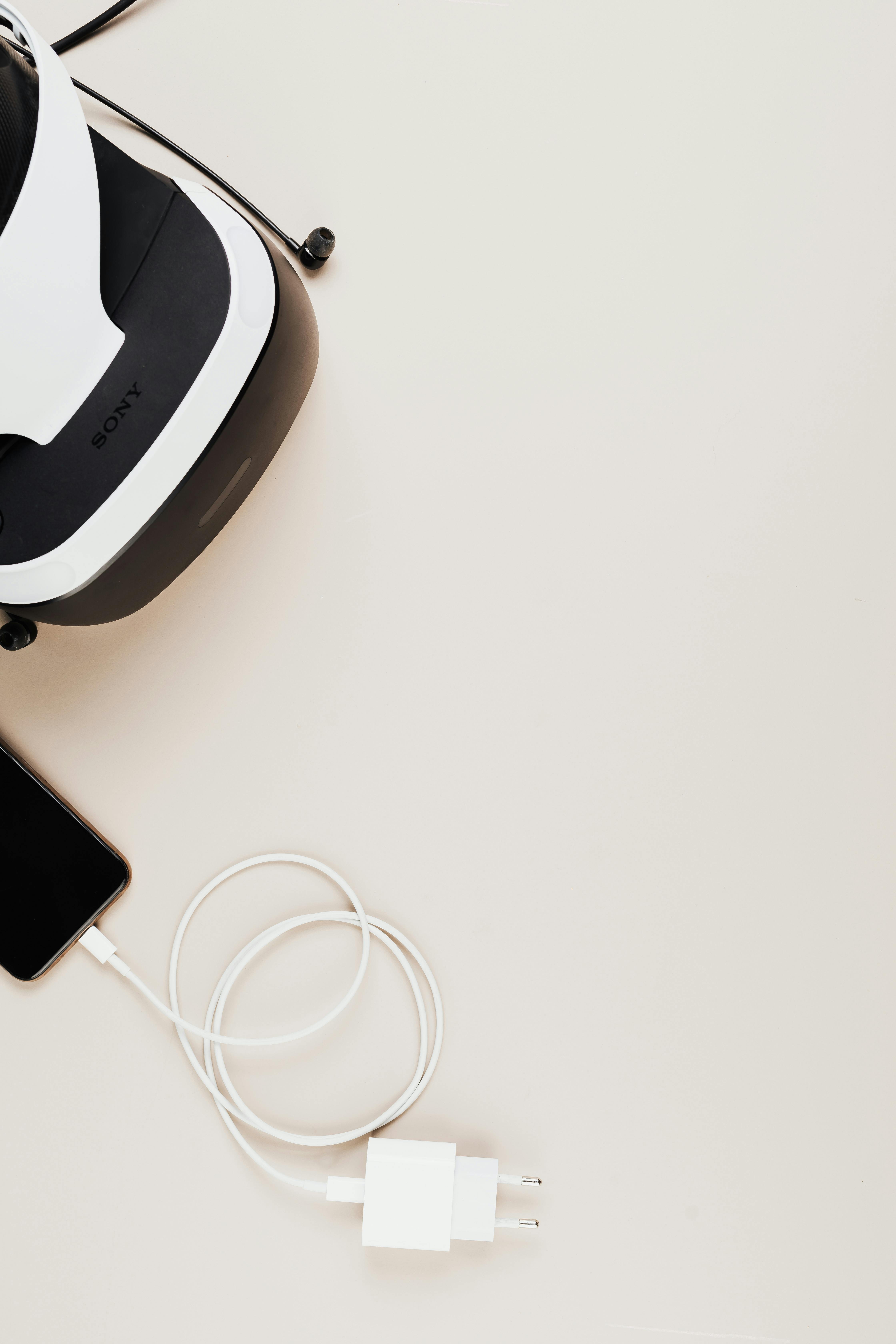 Close-Up Photography of White iPhone Charger · Free Stock Photo