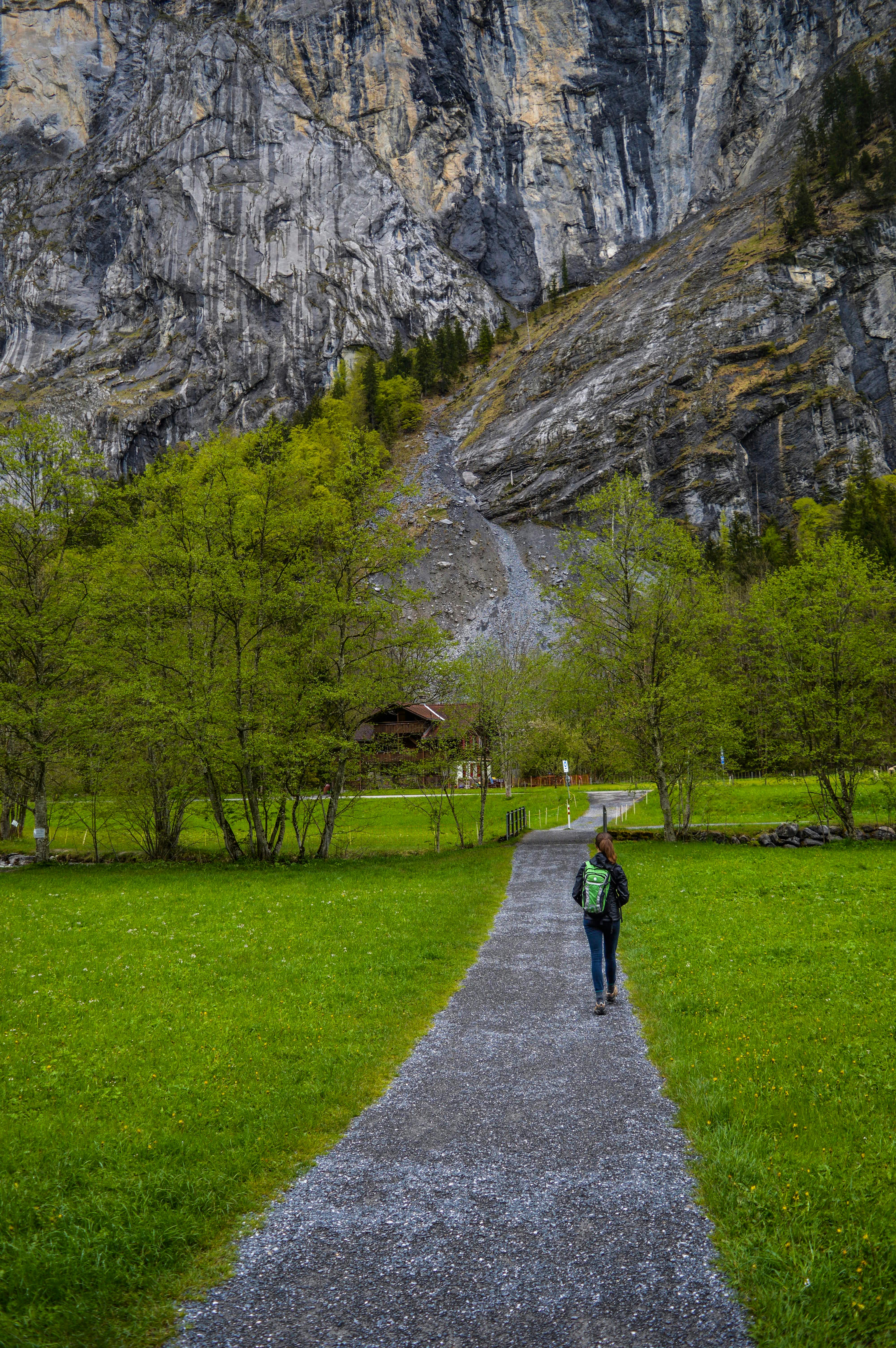 Unrecognizable traveler walking on path · Free Stock Photo